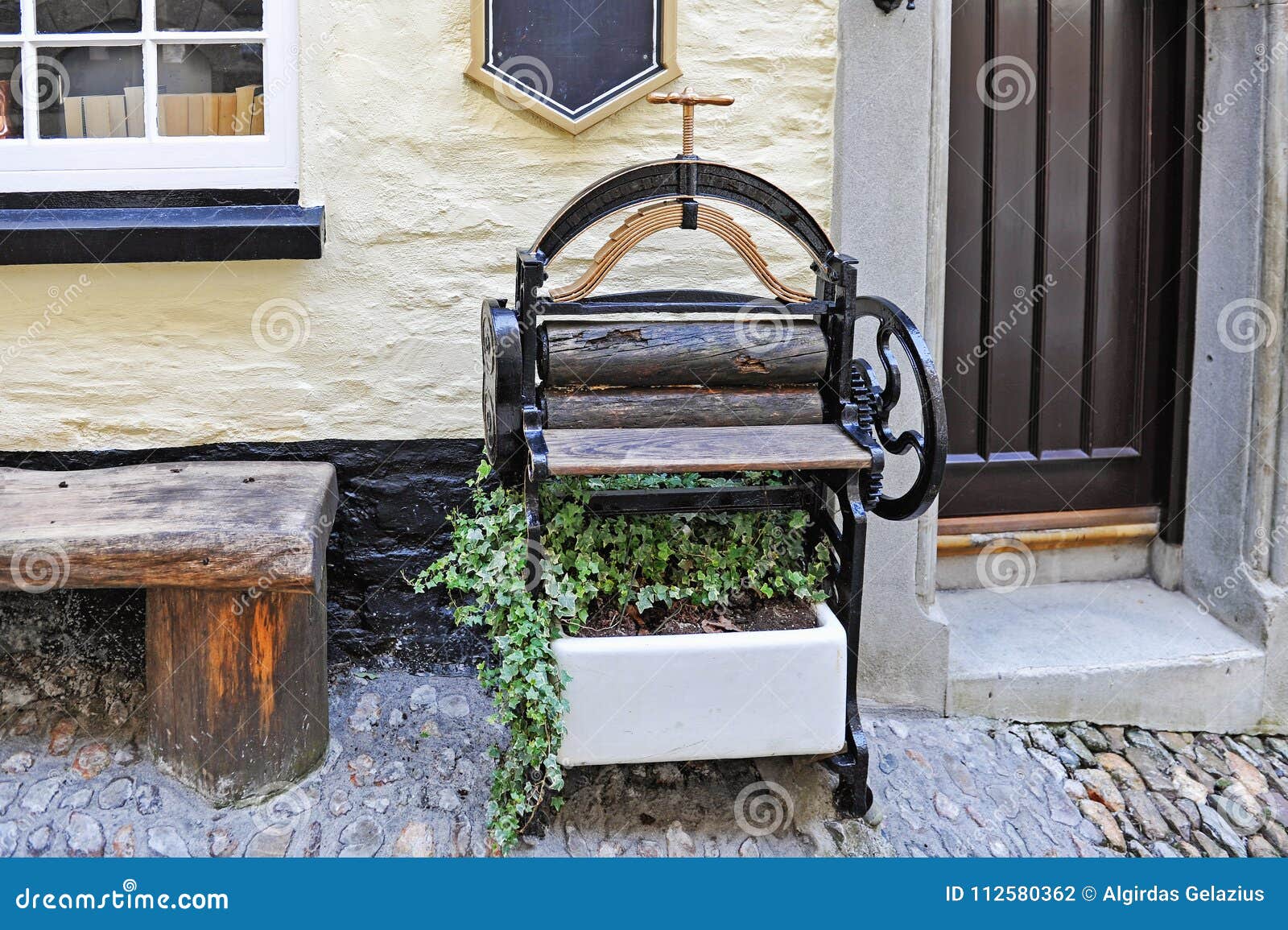 Antique Mangle Victorian Press with Plant Stock Photo - Image of ...