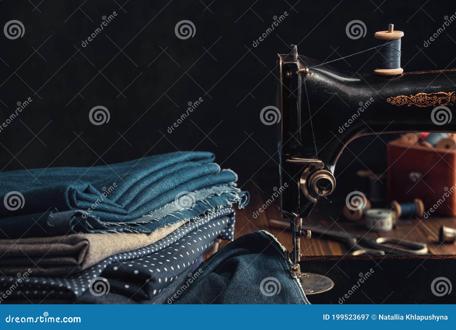 Antique Sewing Machine and Stack of Fabrics. Stock Image - Image of ...