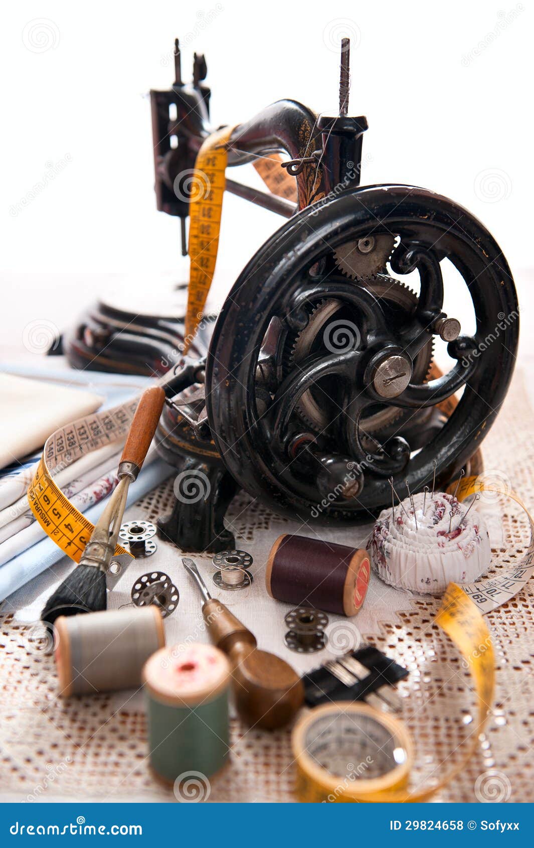 Antique Sewing Machine and Sewing Kit Stock Photo - Image of vertical ...