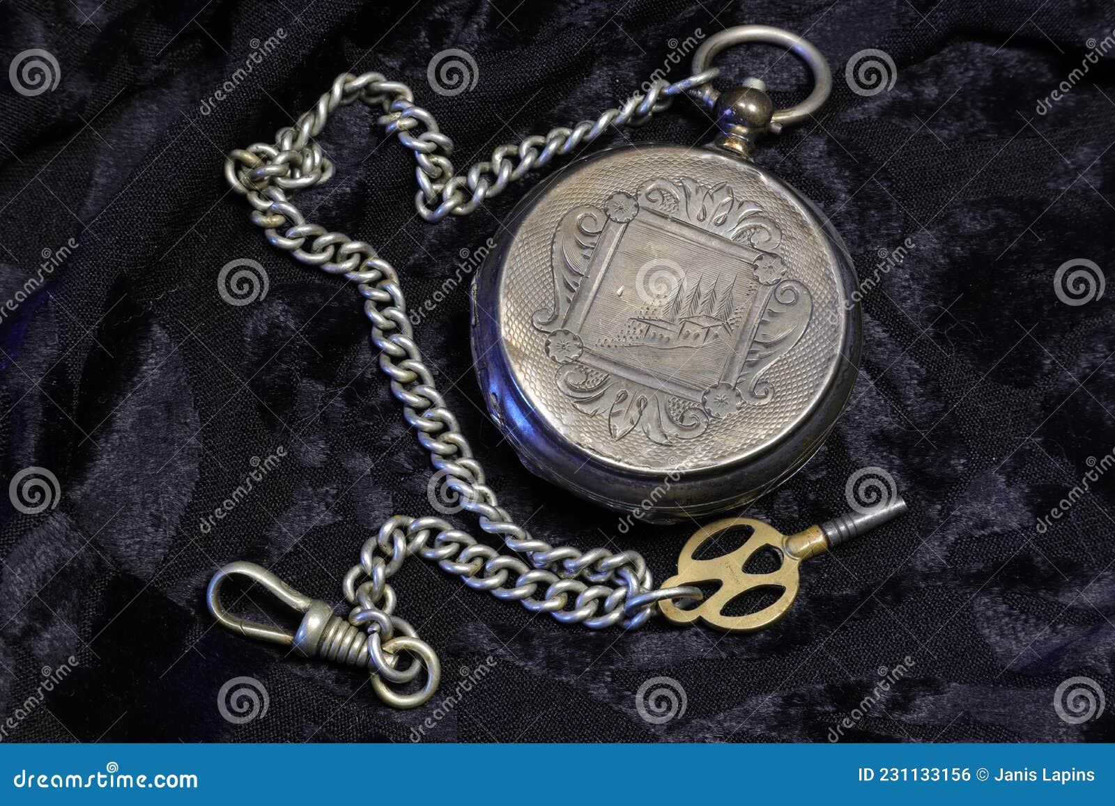 An Antique Silver Pocket Watch with a Chain and Key. Stock Photo ...