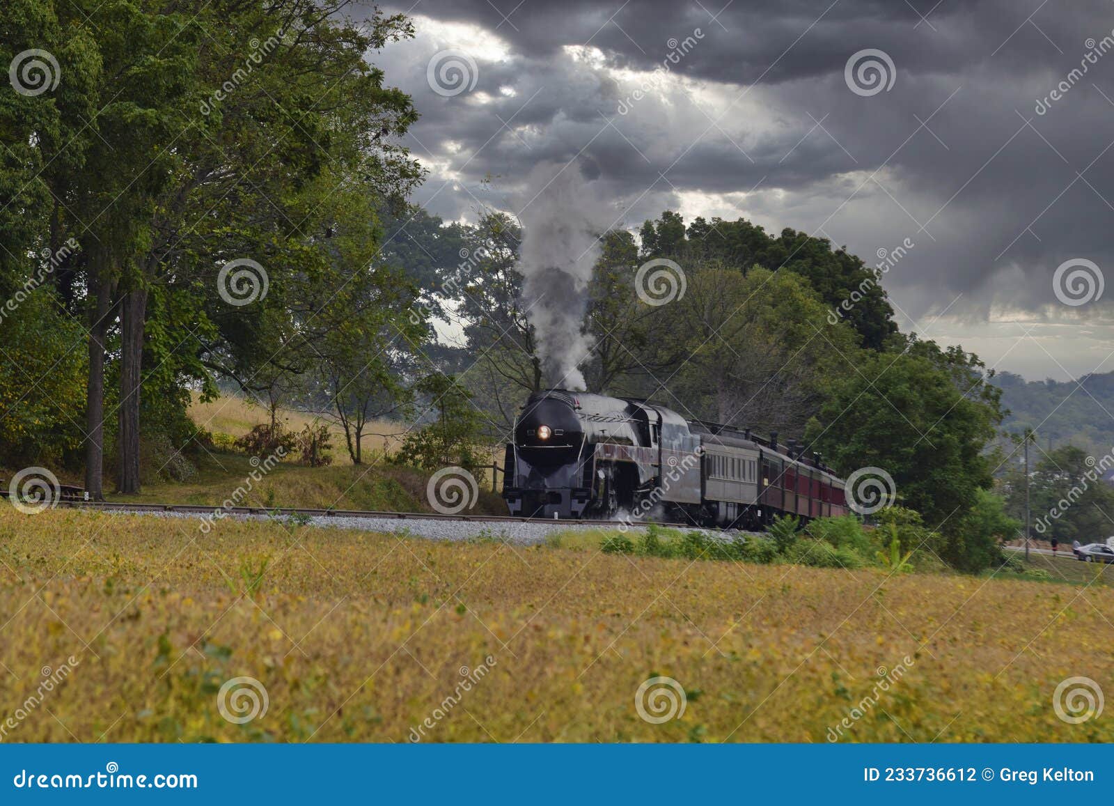 Antique Steam Engine Approaching with Passenger Coaches Stock Photo ...
