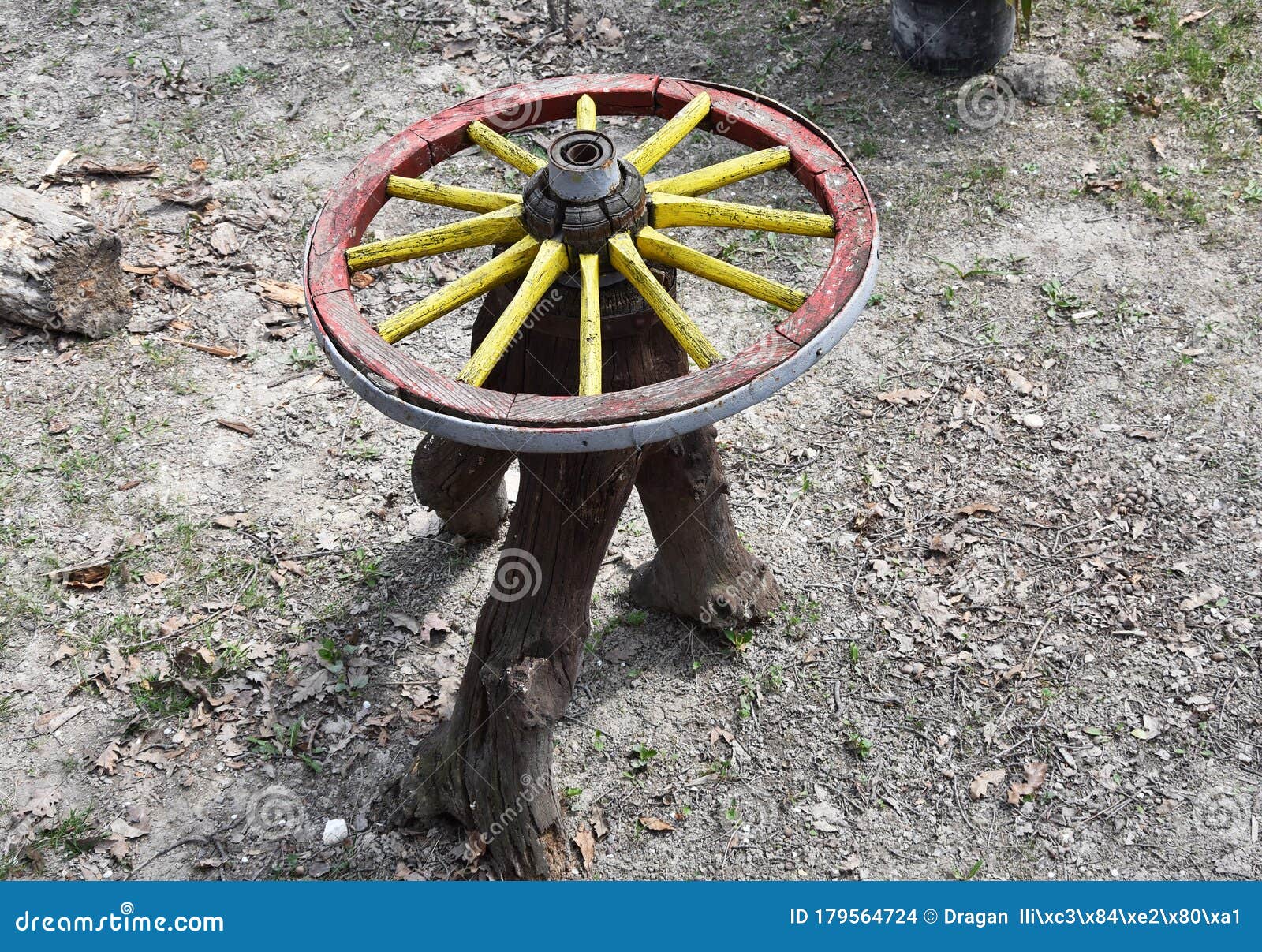 Antique wooden wheel table stock photo. Image of lamp - 179564724