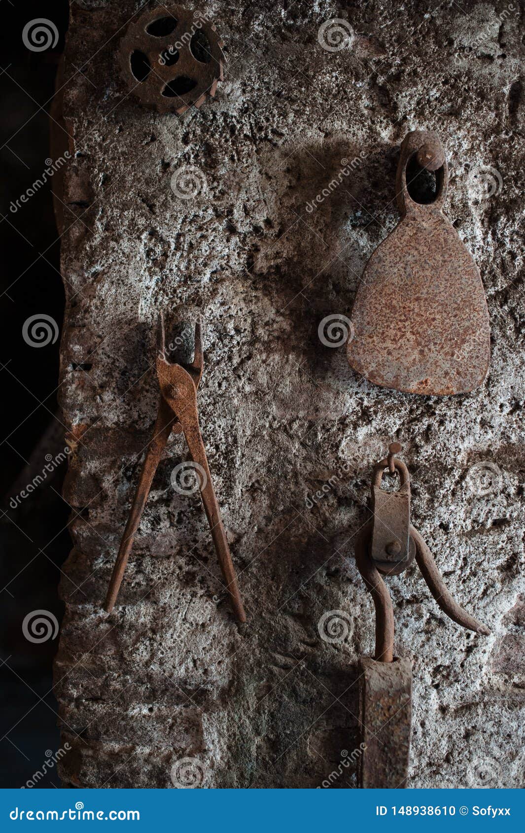 Antique Various Tools on Stone Wall Stock Photo - Image of iron, inside ...