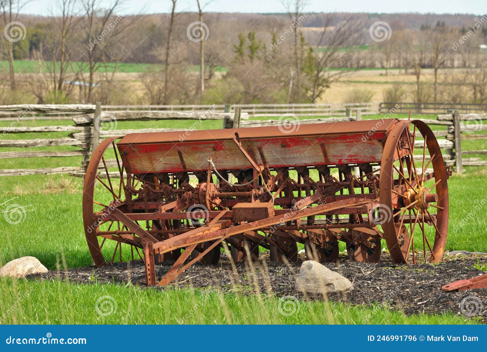 Antique Vintage Farm Seeder Rusty Farm Implement in Field Stock Photo ... Antique Vintage Farm Seeder Rusty Farm Implement in Field Stock Photo ...