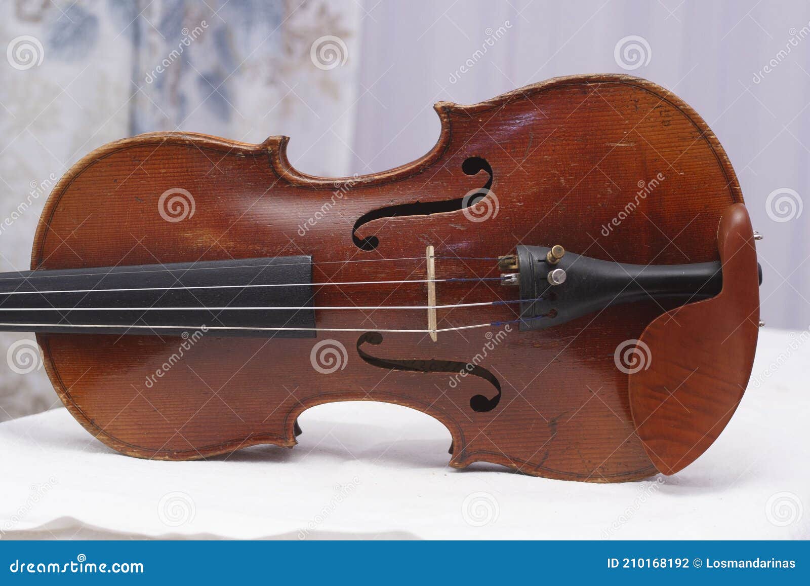 Antique violin on a table stock photo. Image of violin - 210168192