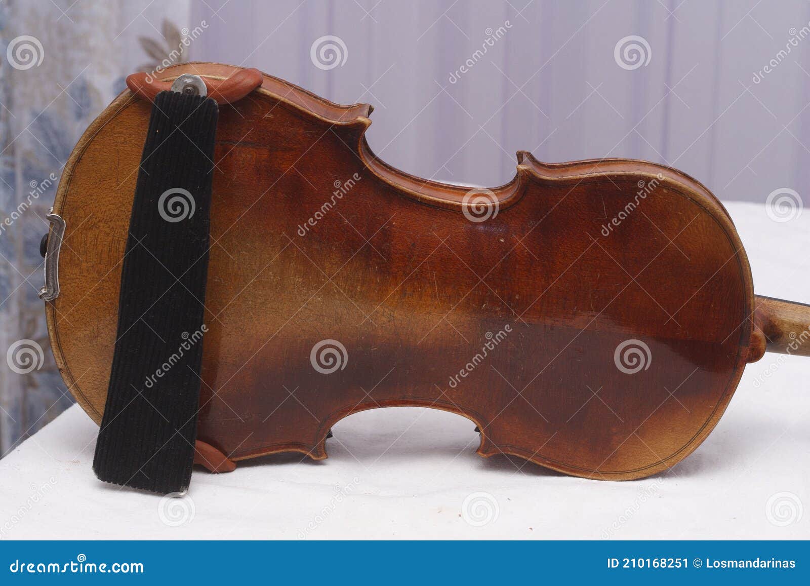 Antique violin on a table stock image. Image of antique - 210168251