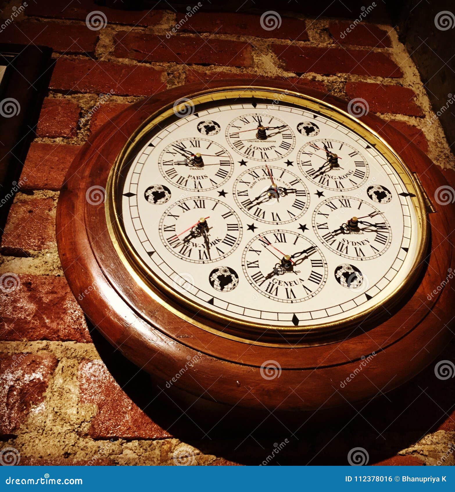 Clocks stock photo. Image of world, clocks, wall, brick - 112378016