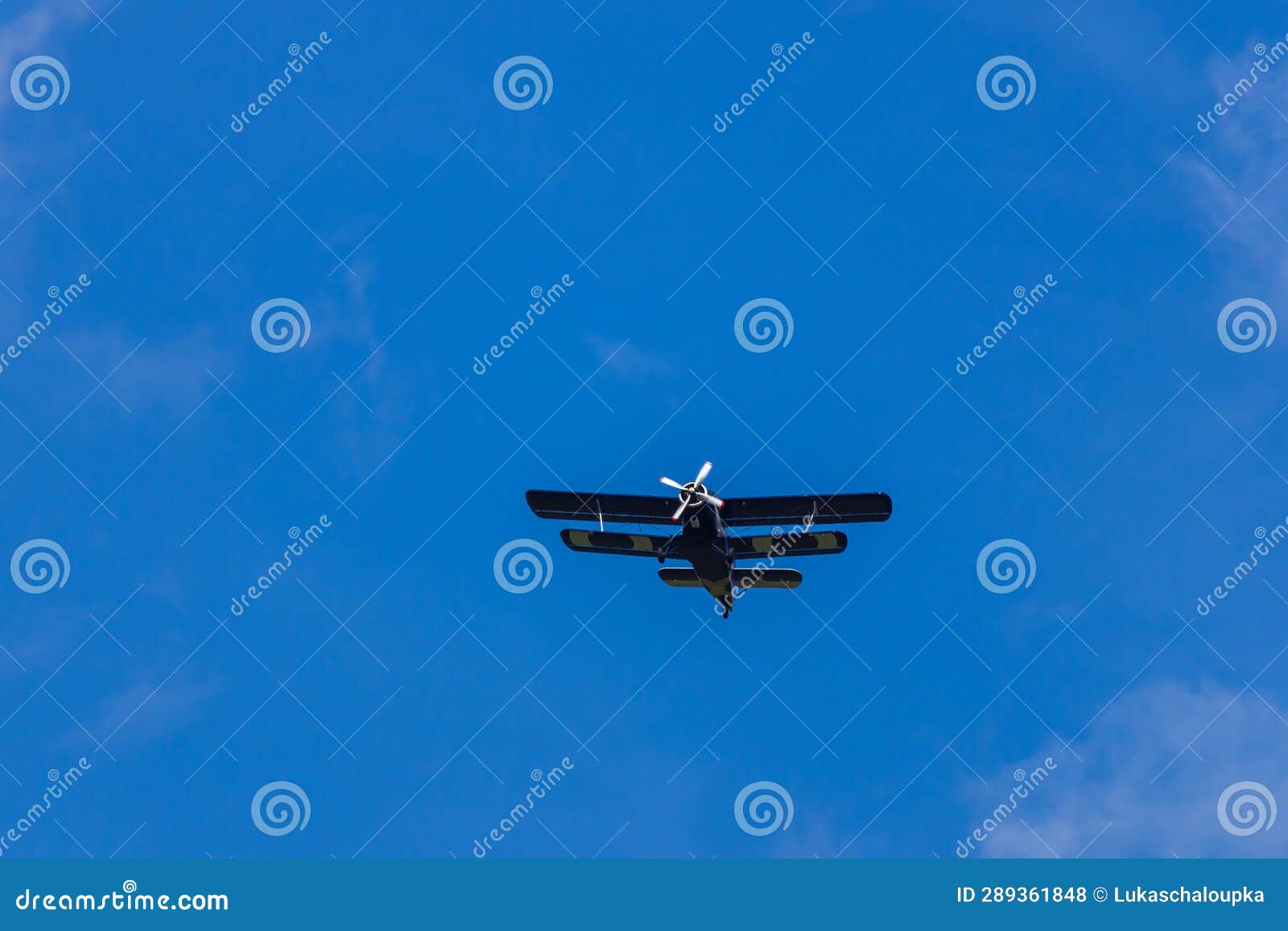 Antonov an-2 Biplane Fly on Blue Sky. Old Blue Historic Plane from ...