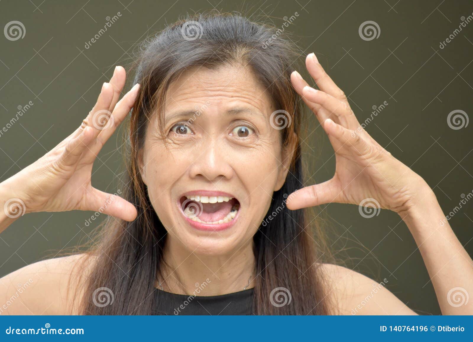 An Anxious Adult Female stock photo. Image of mature - 140764196