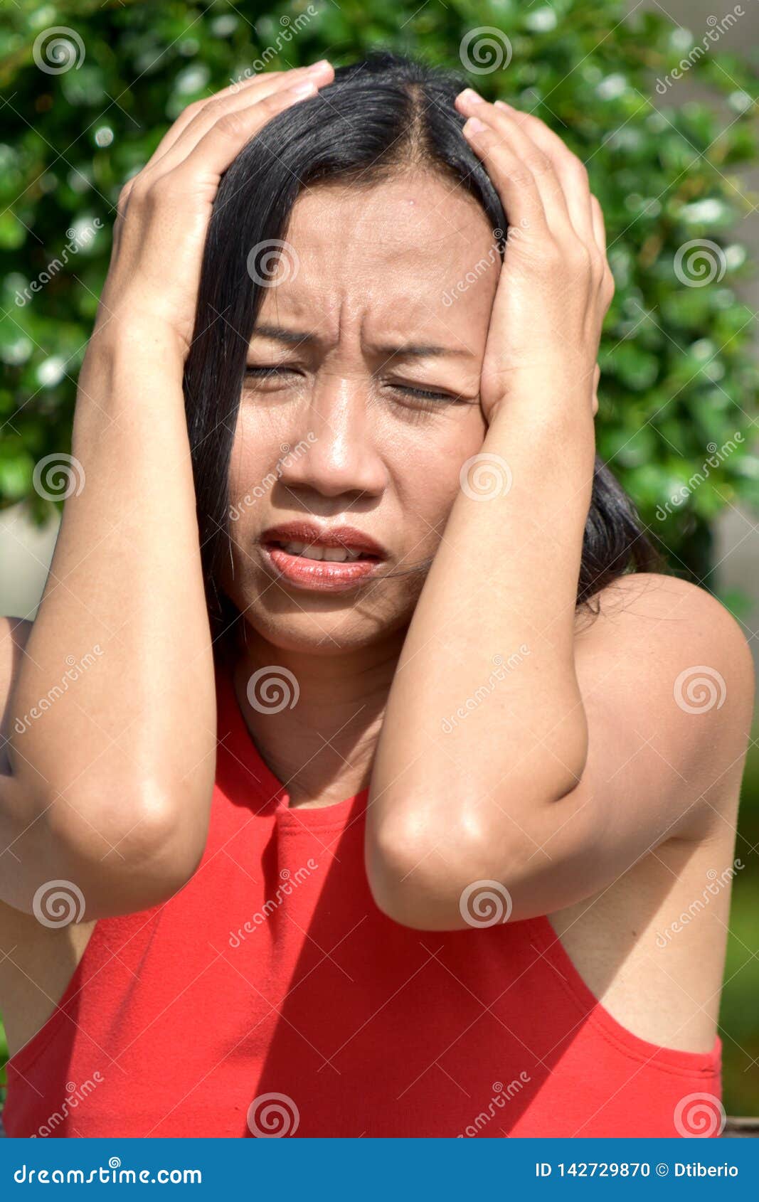 An Anxious Female Woman stock photo. Image of anxious - 142729870