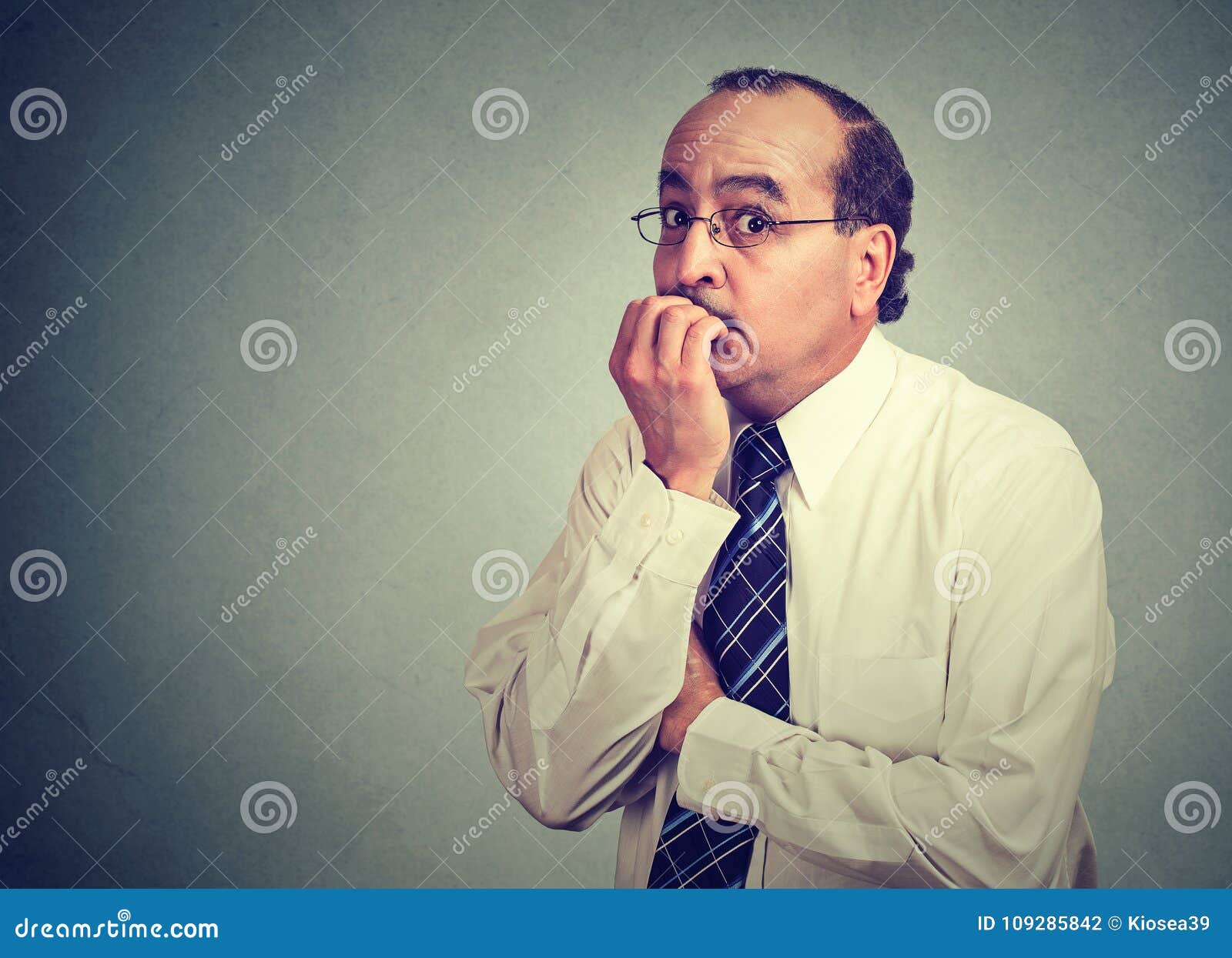 Anxious Male Worker Biting Nails Stock Photo - Image of eyeglasses ...