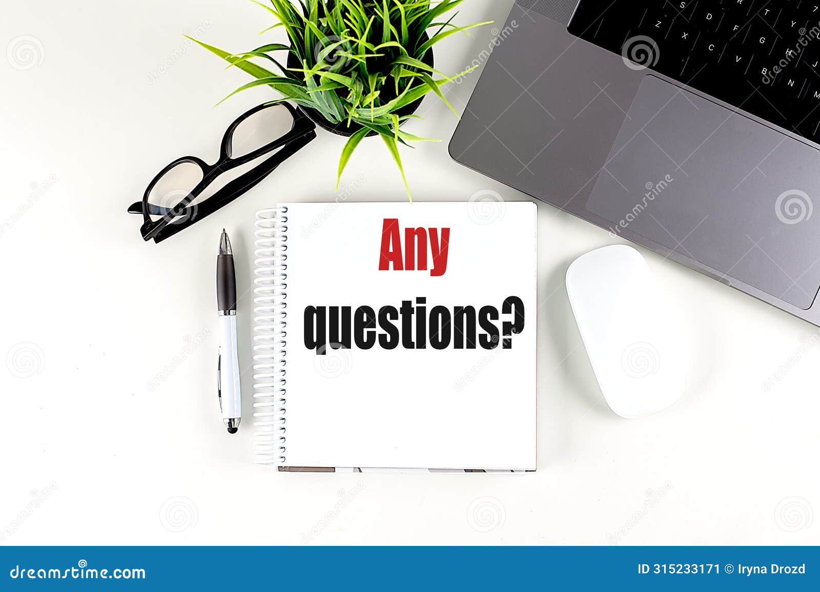 ANY QUESTIONS Text on Notebook with Laptop, Mouse and Pen Stock Image ...