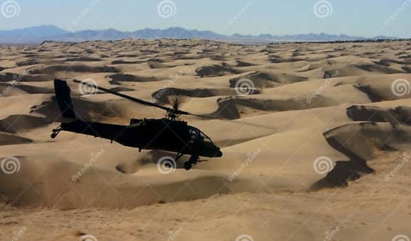 Apache Over Sand Dunes stock photo. Image of apache, helicopter - 1266940