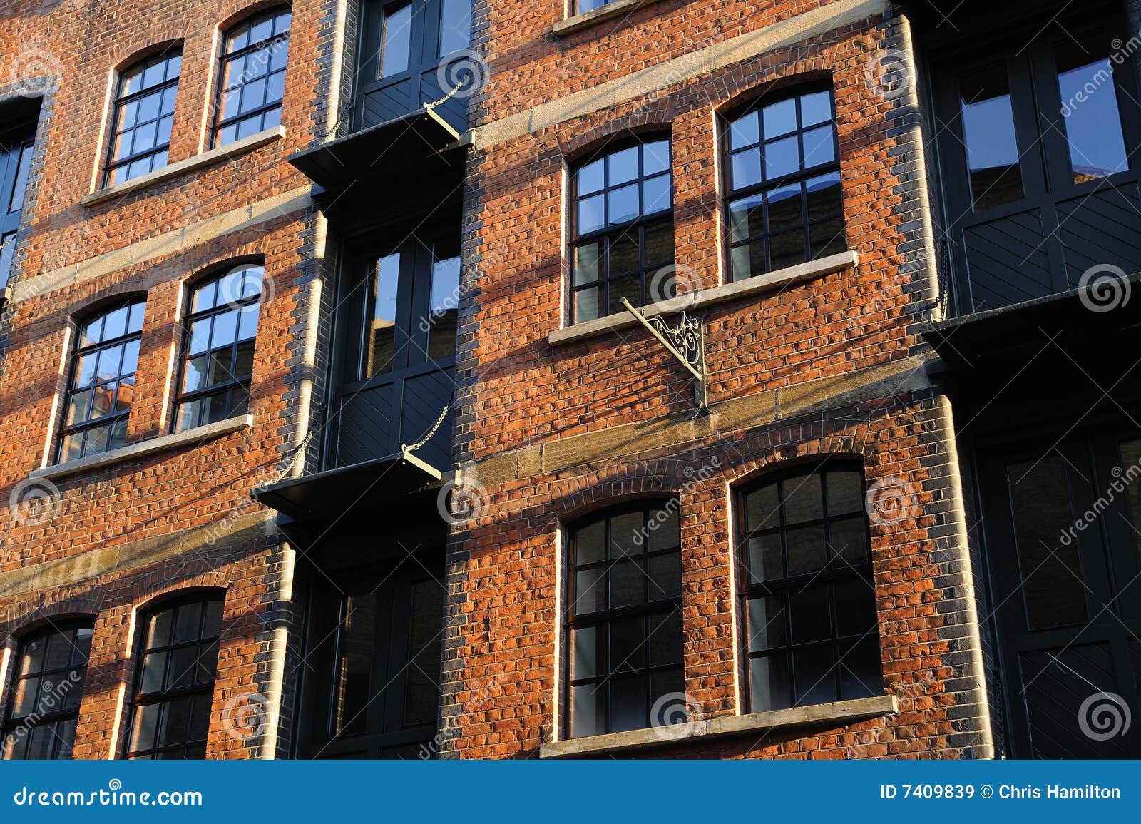 Apartment Windows stock image. Image of windows, brick - 7409839