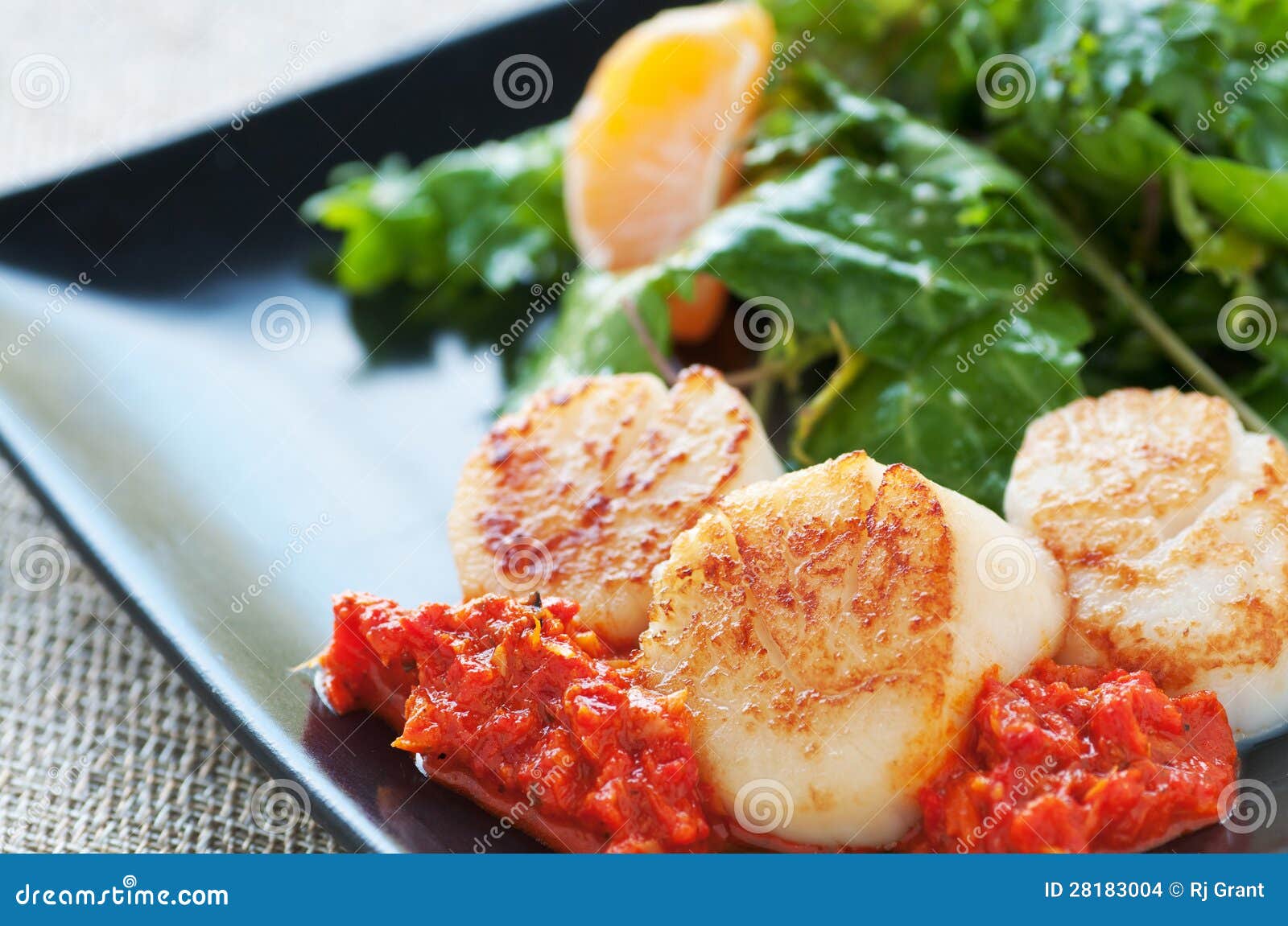 Aperitivo Chamuscado De La Concha De Peregrino Foto de archivo - Imagen ...