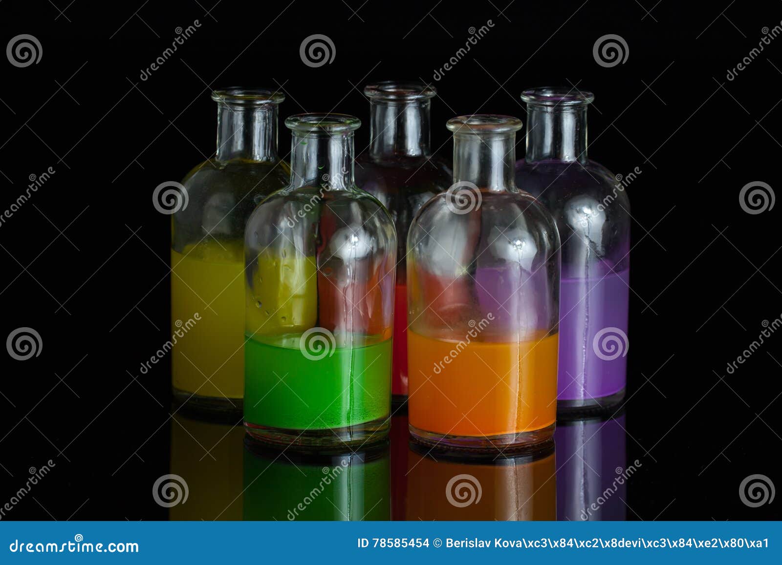Apothecary, Laboratory Bottles with Colored Liquid with Reflection ...