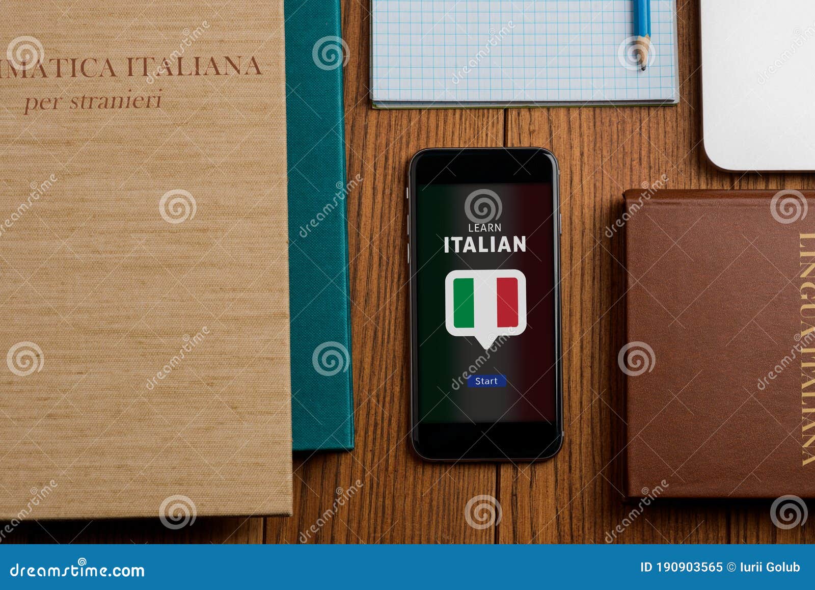 App and Textbooks for Learning Italian. Books, Phone and Notepad Stock ...