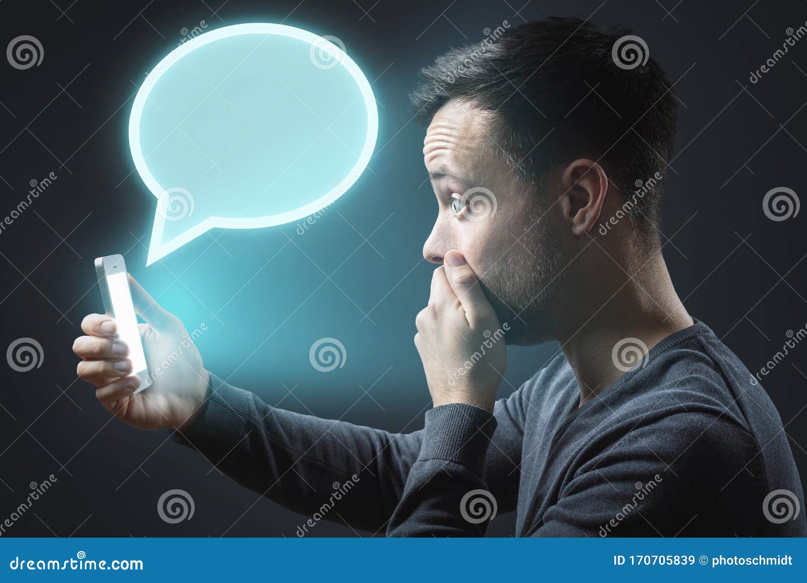 Appalled Man Getting a Message on His Smartphone Stock Image - Image of ...