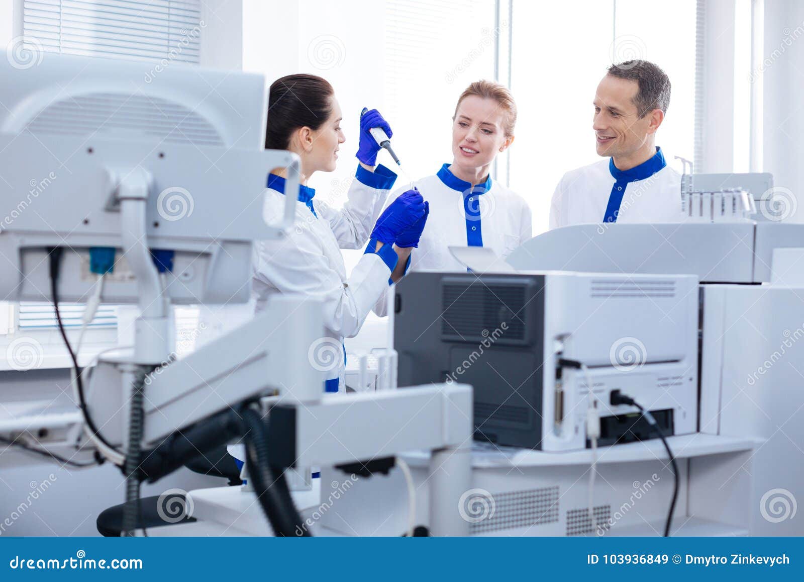 Appealing Couple of Laboratorians Observing Intern Performance Stock ...