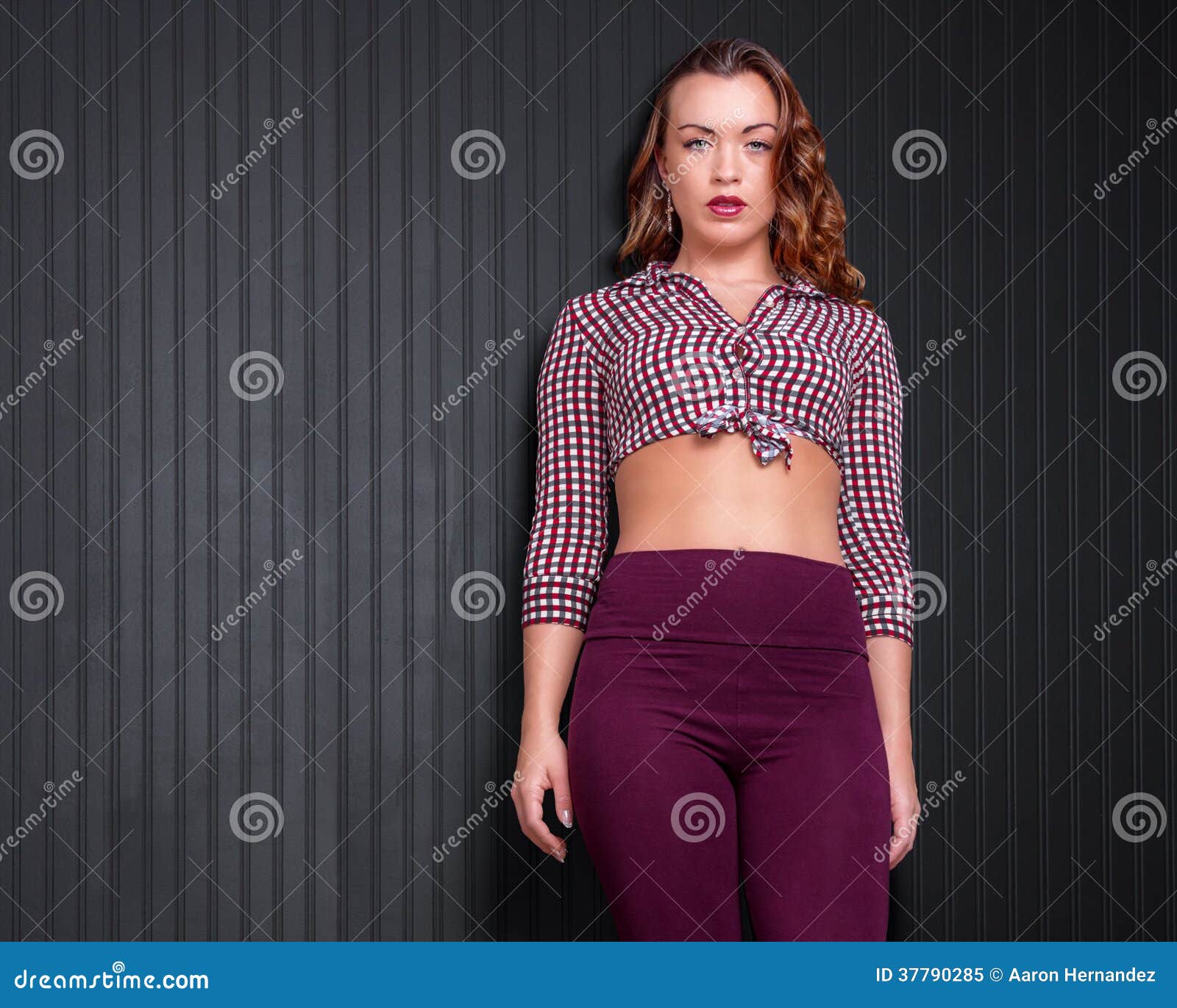 Appealing Fit Young Female Leaning on Wall Stock Image - Image of body ...