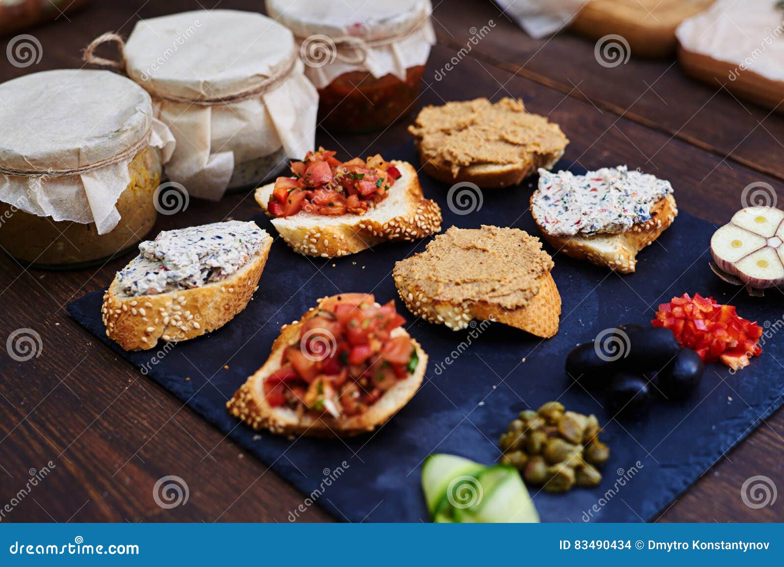 Appetizer Canapes of Baguette with Different Combinations of Top Stock ...