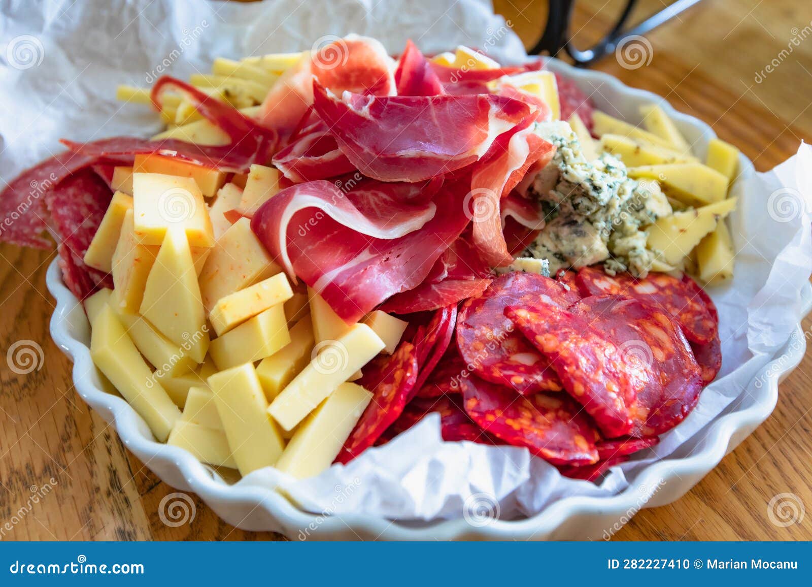 Appetizer Platter with Various Cheeses, Salami, Ham Stock Photo - Image ...