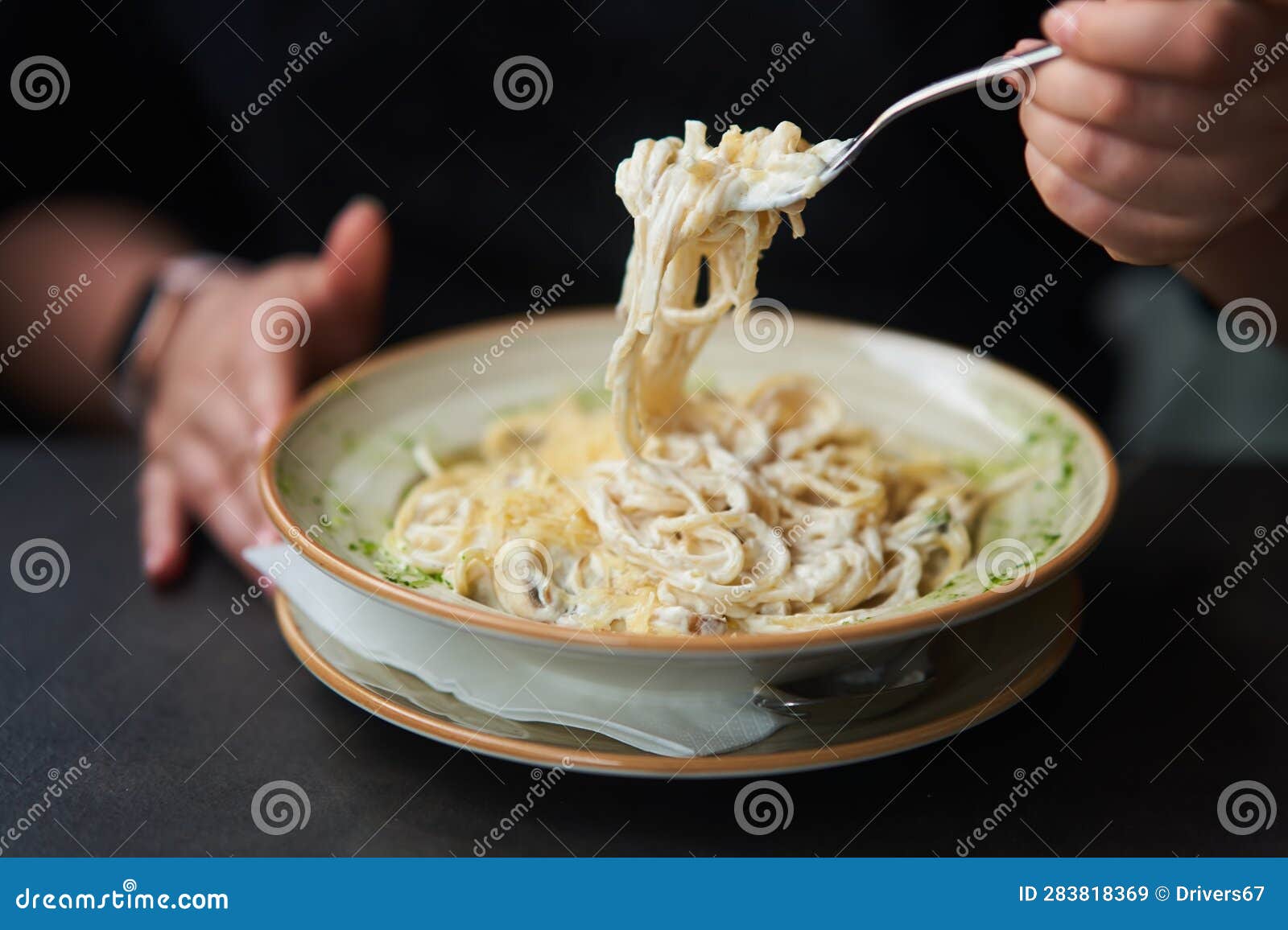 Appetizing Carbonara Paste with Chicken Improperly Wound on Fork ...