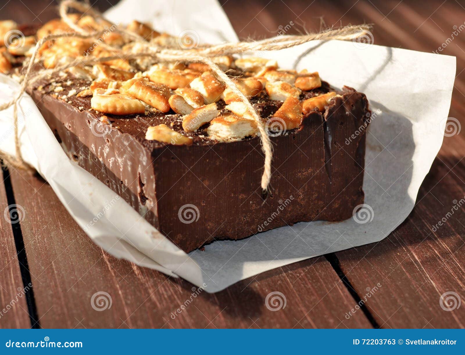 An Appetizing Chocolate Cake Decorated with Small Pieces of Biscuits ...