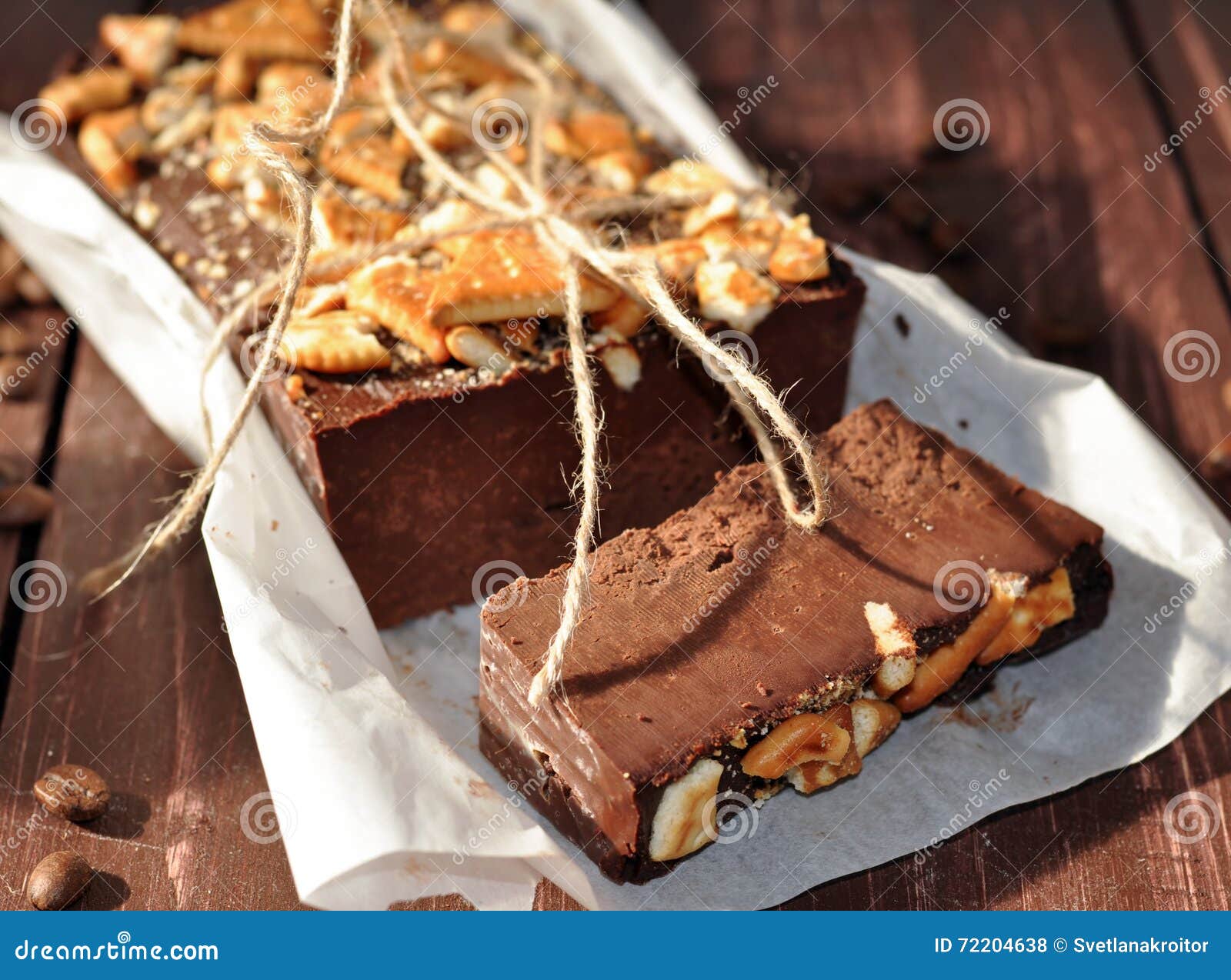 An Appetizing Chocolate Cake Decorated with Small Pieces of Biscuits ...