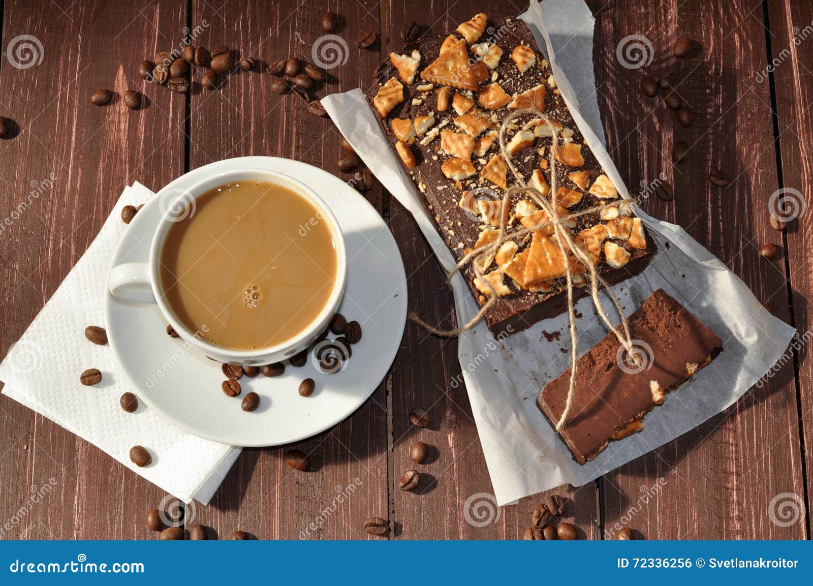 An Appetizing Chocolate Cake Decorated with Small Pieces of Biscuits ...