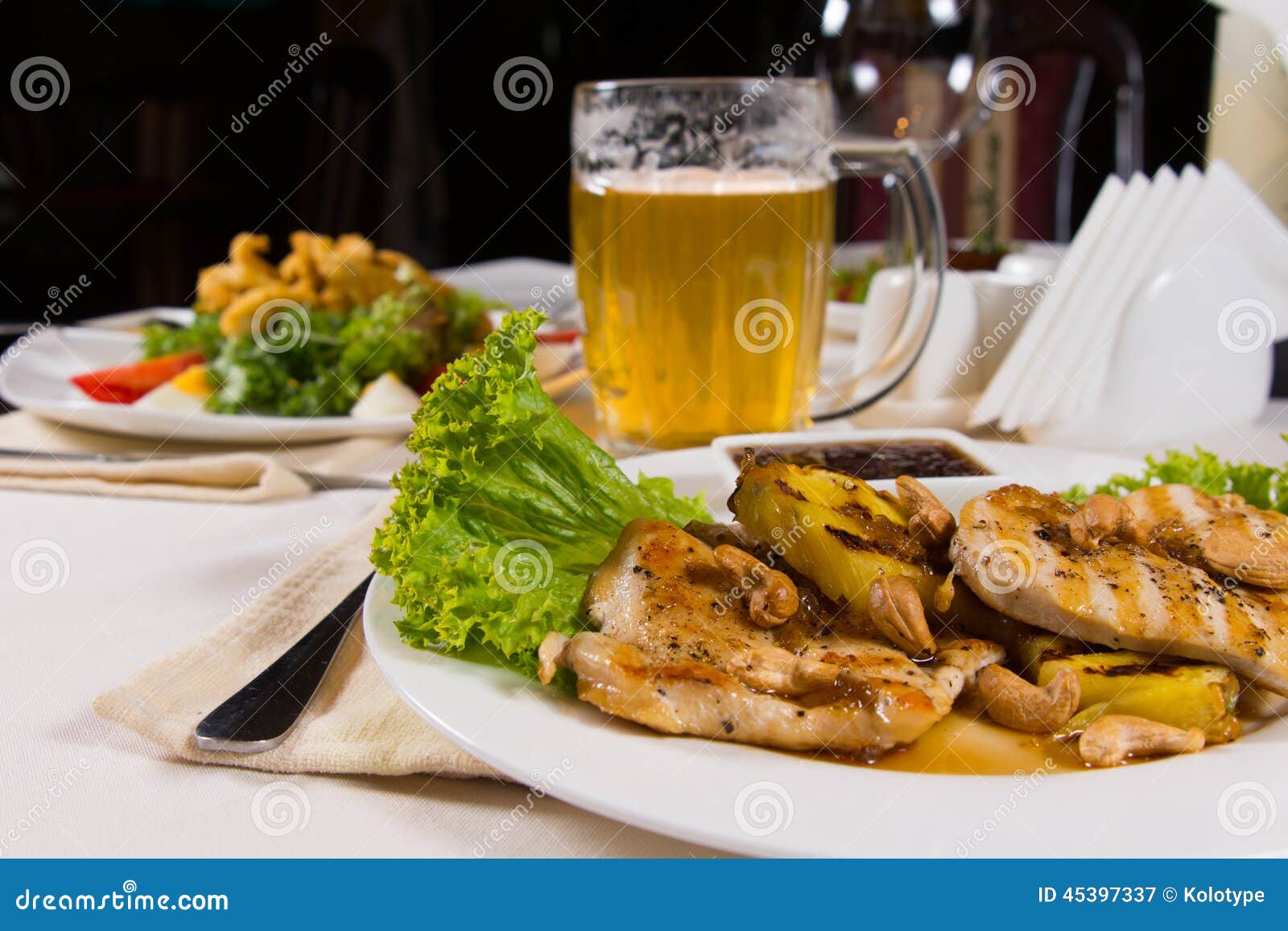 Appetizing Dishes and Beer Mug on Table Stock Image - Image of dine ...