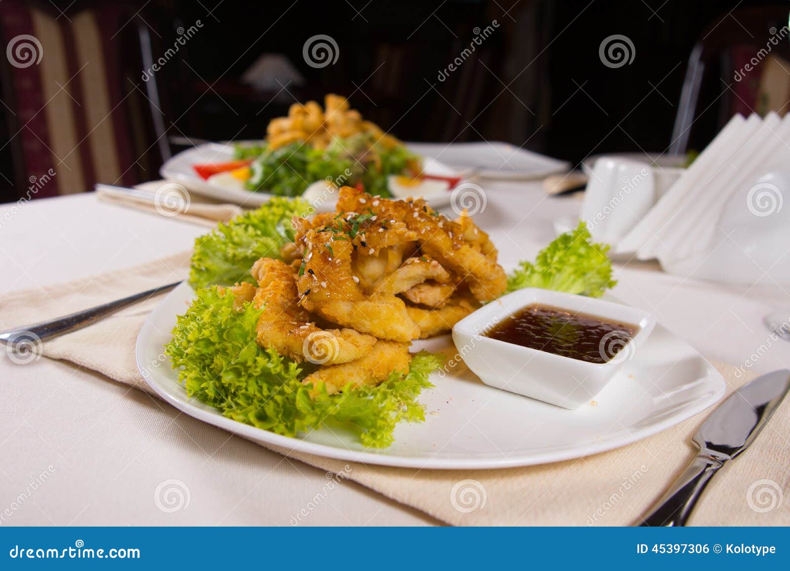 Appetizing Fried Main Dish with Hot Sauce on Plate Stock Photo - Image ...