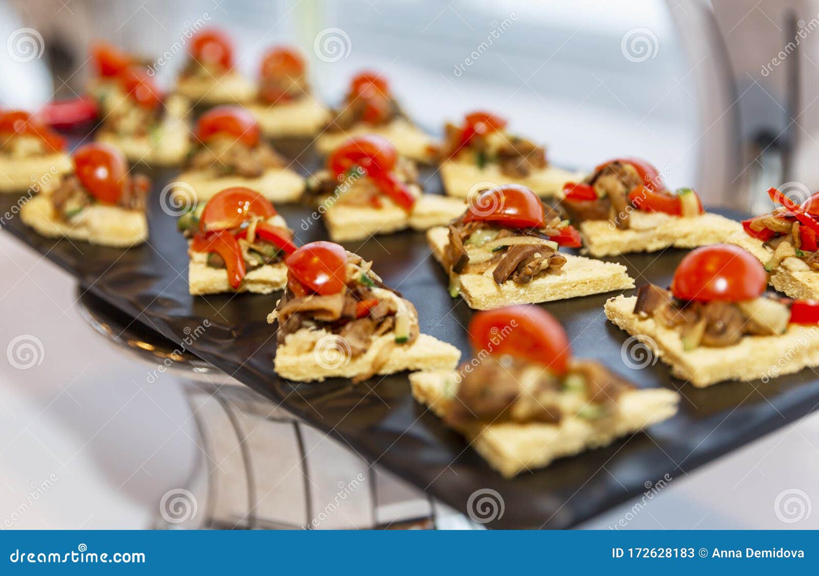 Appetizing Snacks on the Buffet Table at the Event. Canapes with Meat ...