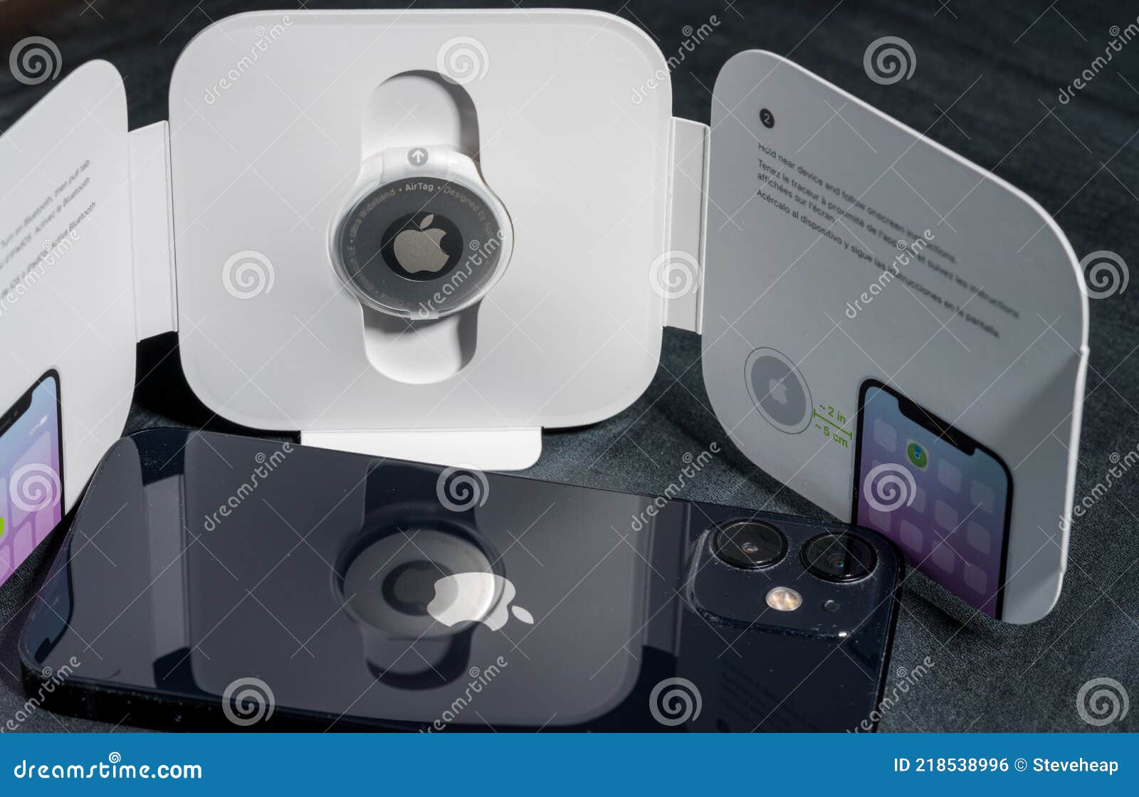 Apple AirTag in Packaging with IPhone Reflecting the Logo Editorial ...