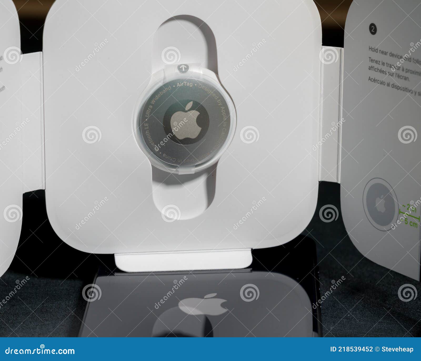 Apple AirTag in Packaging with IPhone Reflecting the Logo Editorial ...