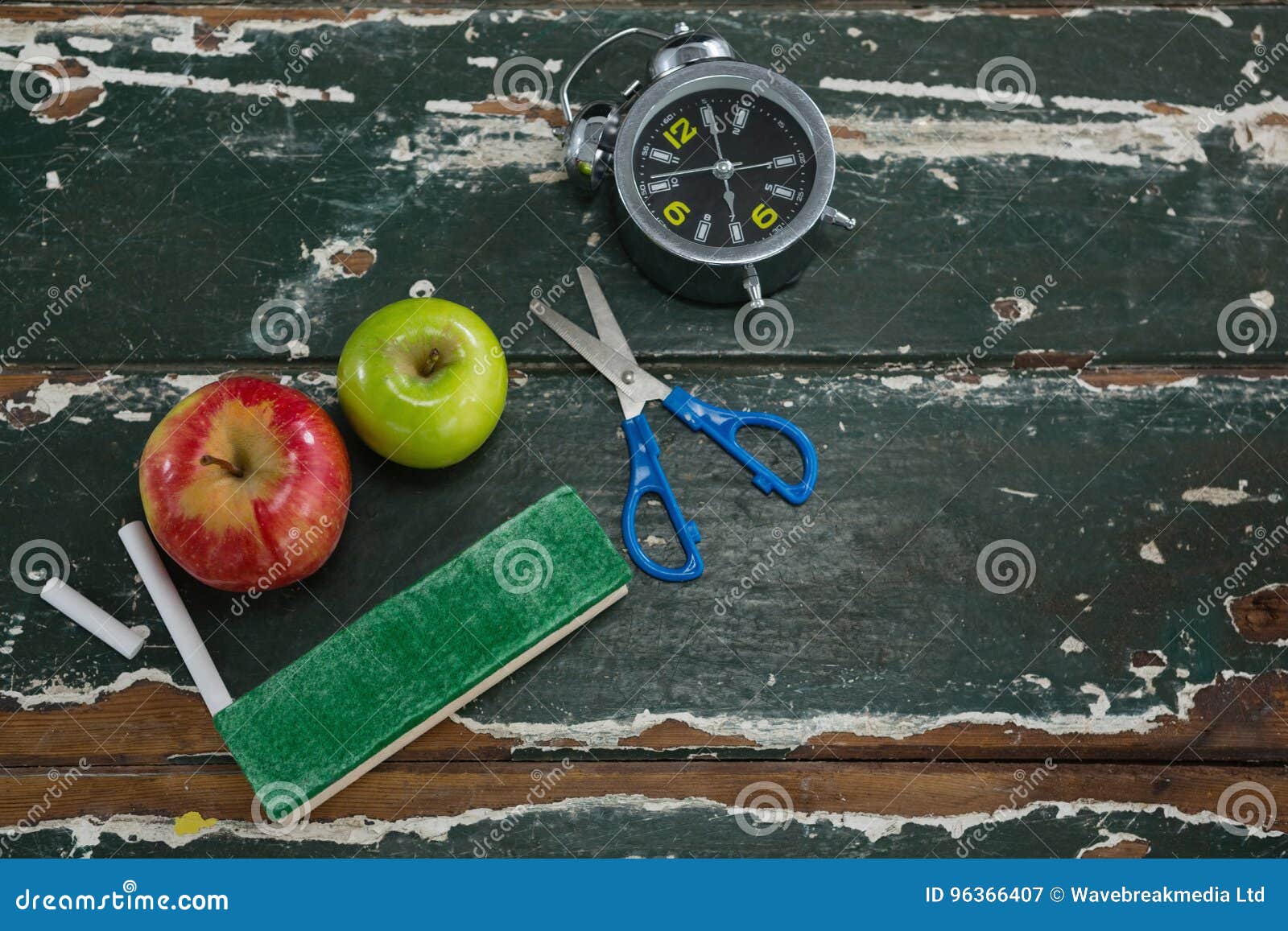 Apple, Alarm Clock, Duster, Scissors and Chalk on Wooden Table Stock ...