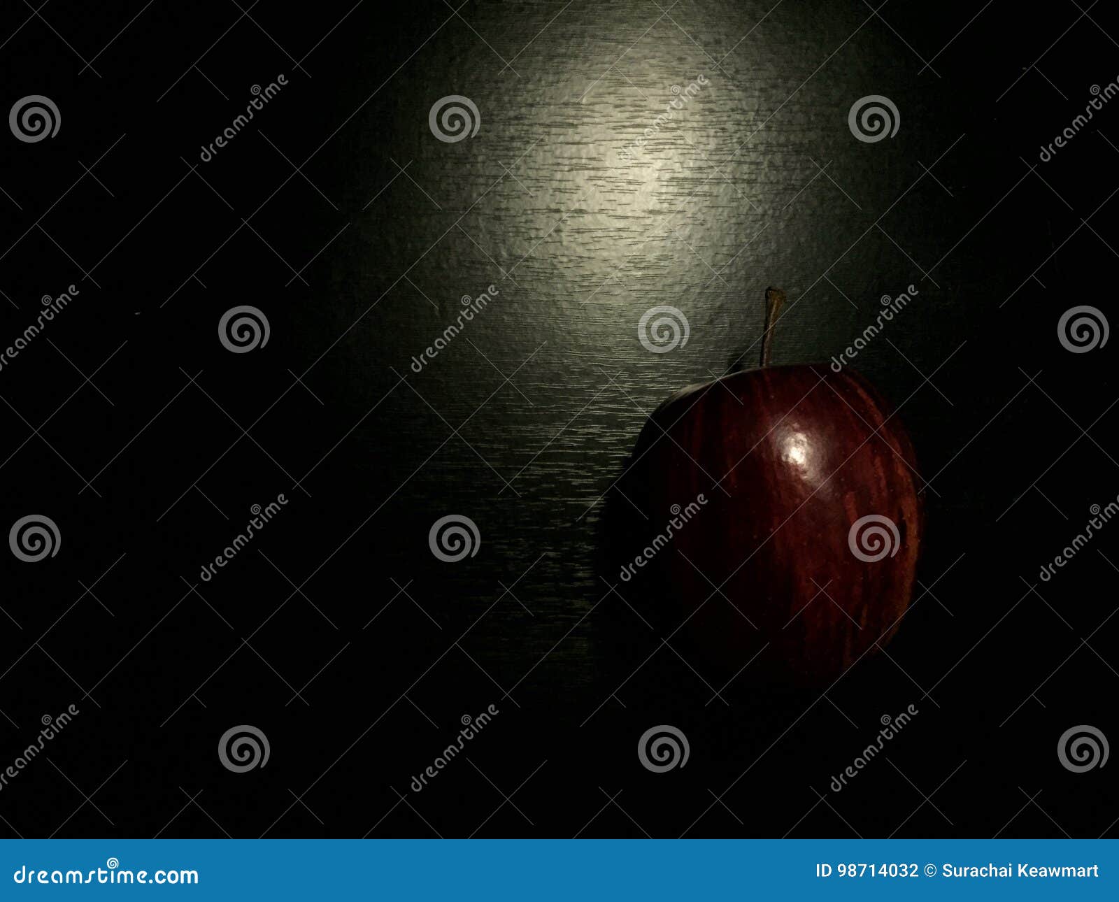 Apple on Black Table Hide in the Dark Shadow Stock Photo - Image of ...