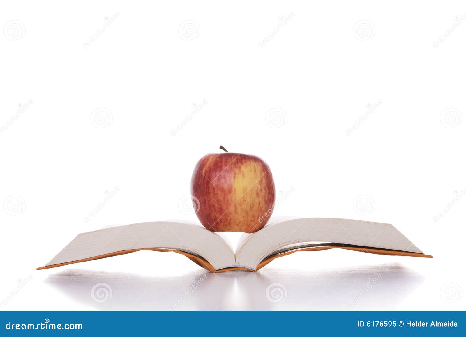 Apple in the book stock image. Image of educate, exam - 6176595