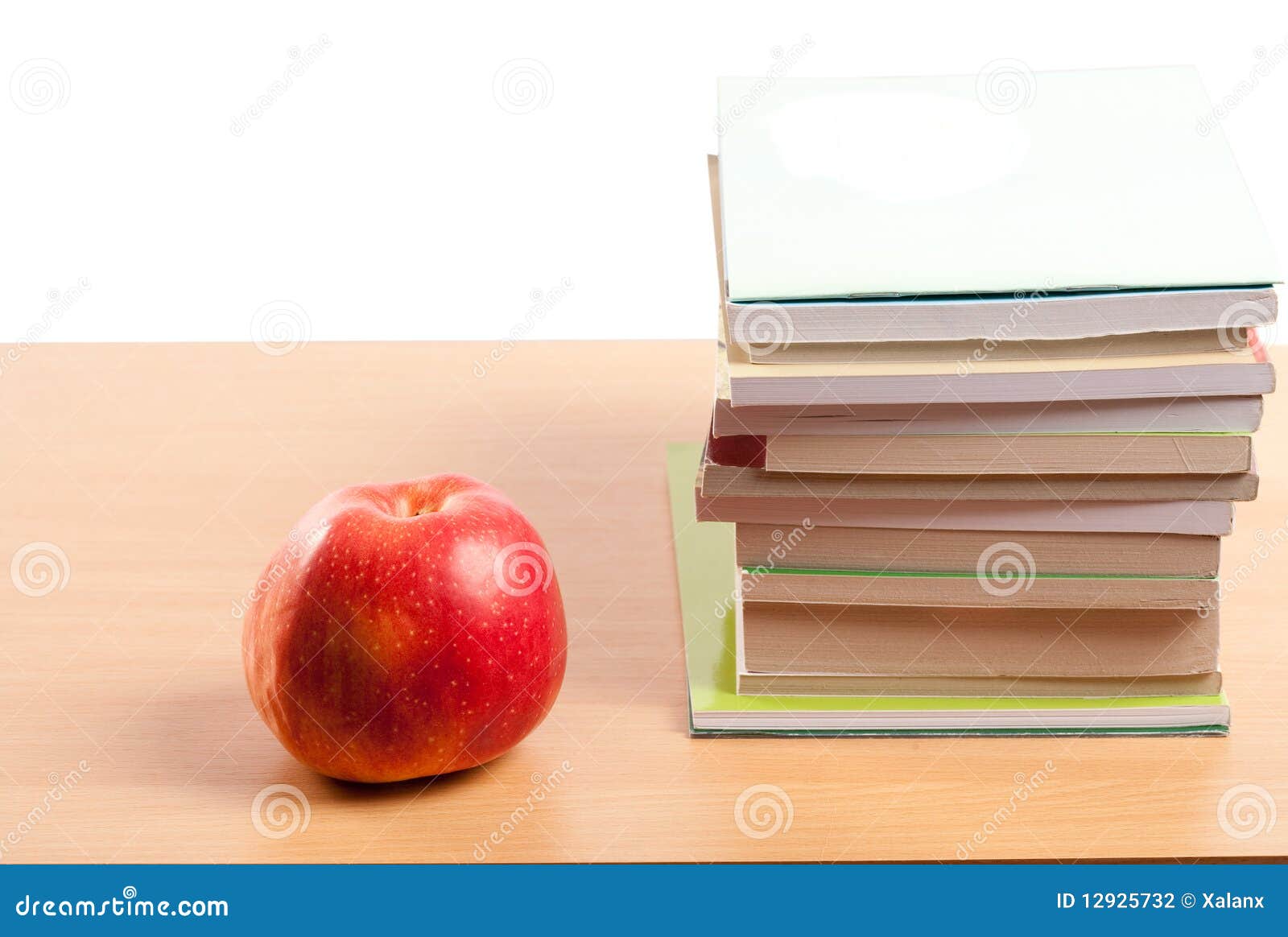Apple and books stock photo. Image of learning, book - 12925732