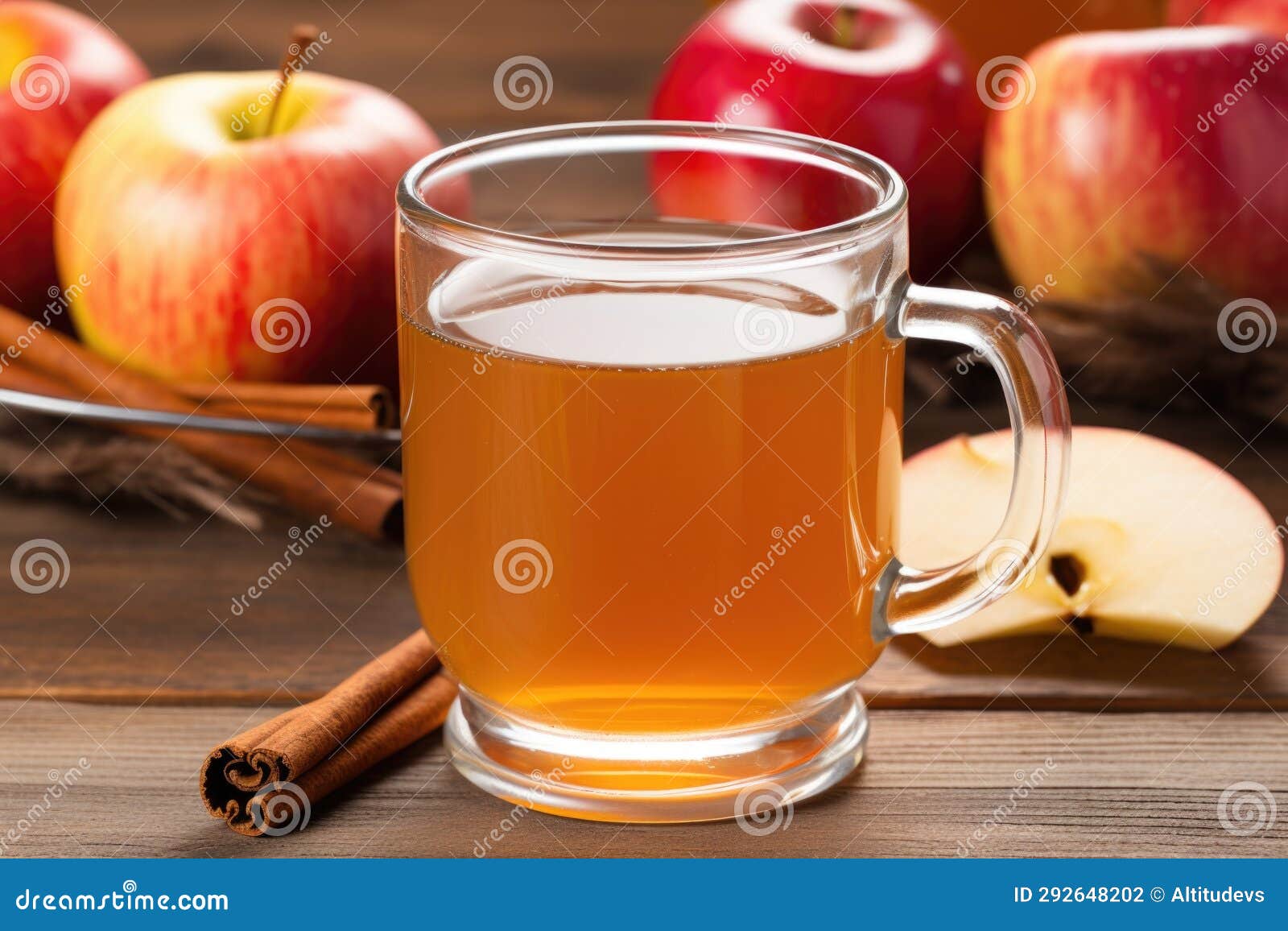 Apple Cider in a Clear Glass Mug with Cinnamon Stick Stock Photo ...
