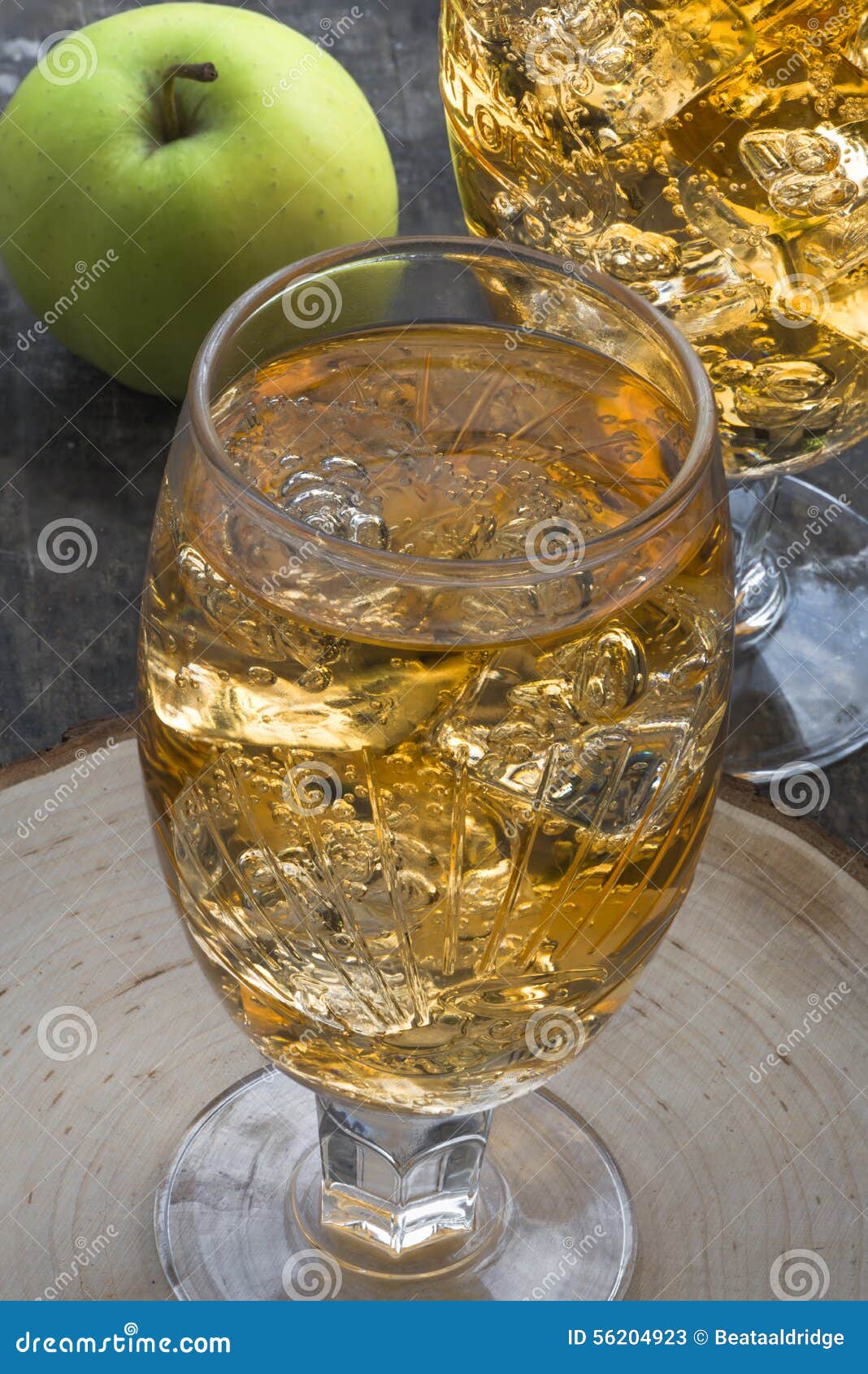 Apple cider with ice cubes stock image. Image of alcohol - 56204923