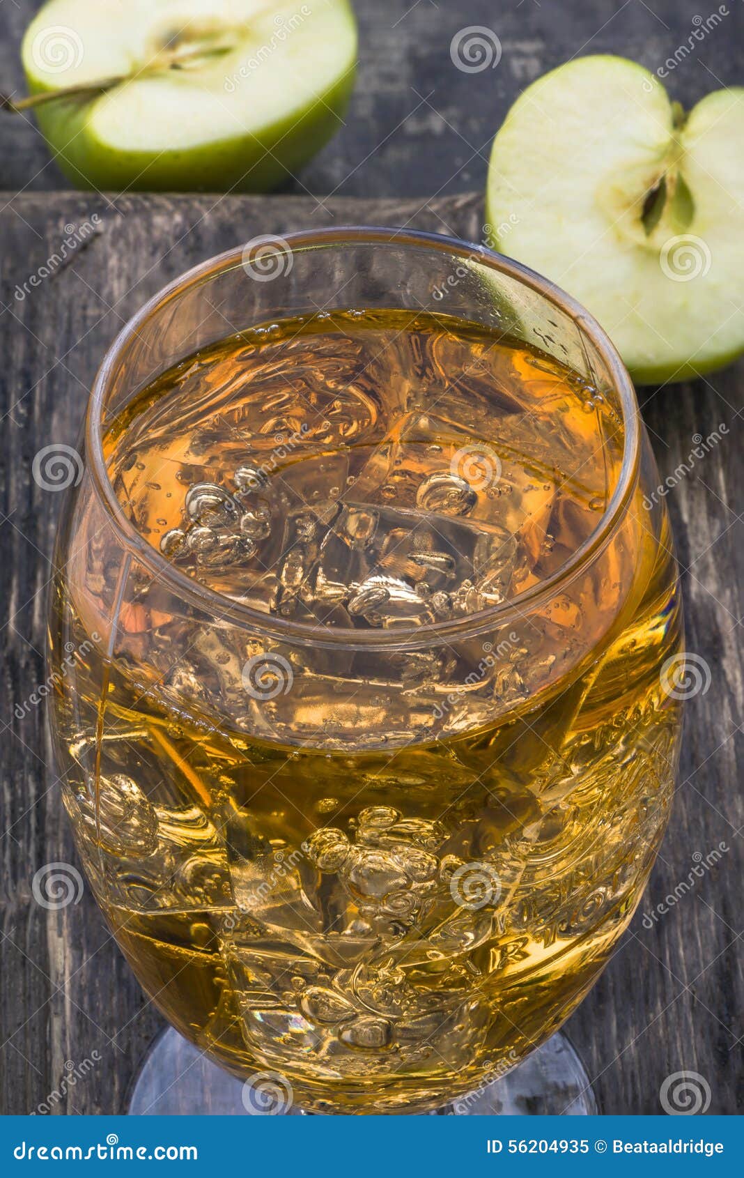 Apple cider with ice cubes stock image. Image of apples - 56204935