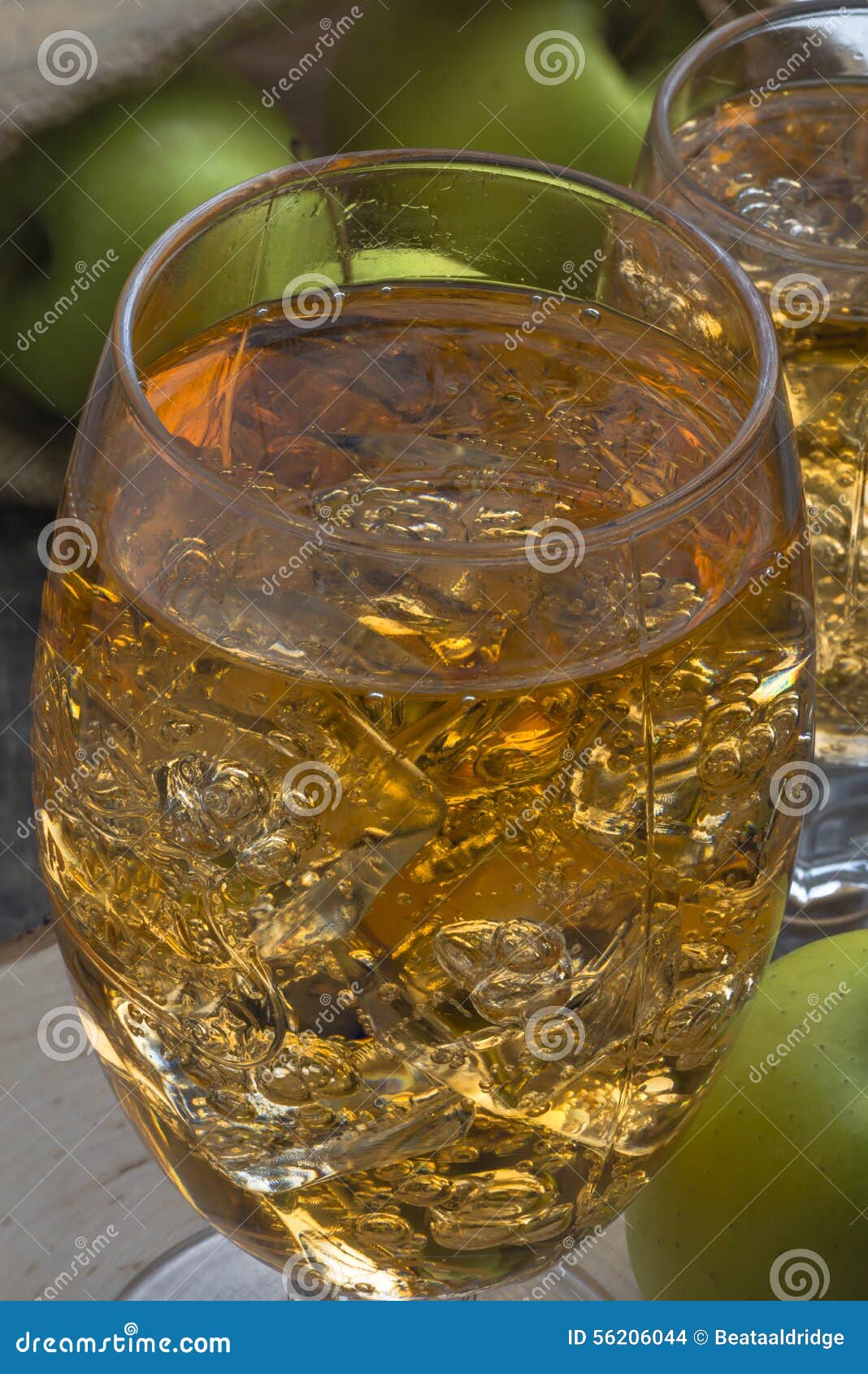 Apple cider with ice cubes stock photo. Image of drink - 56206044