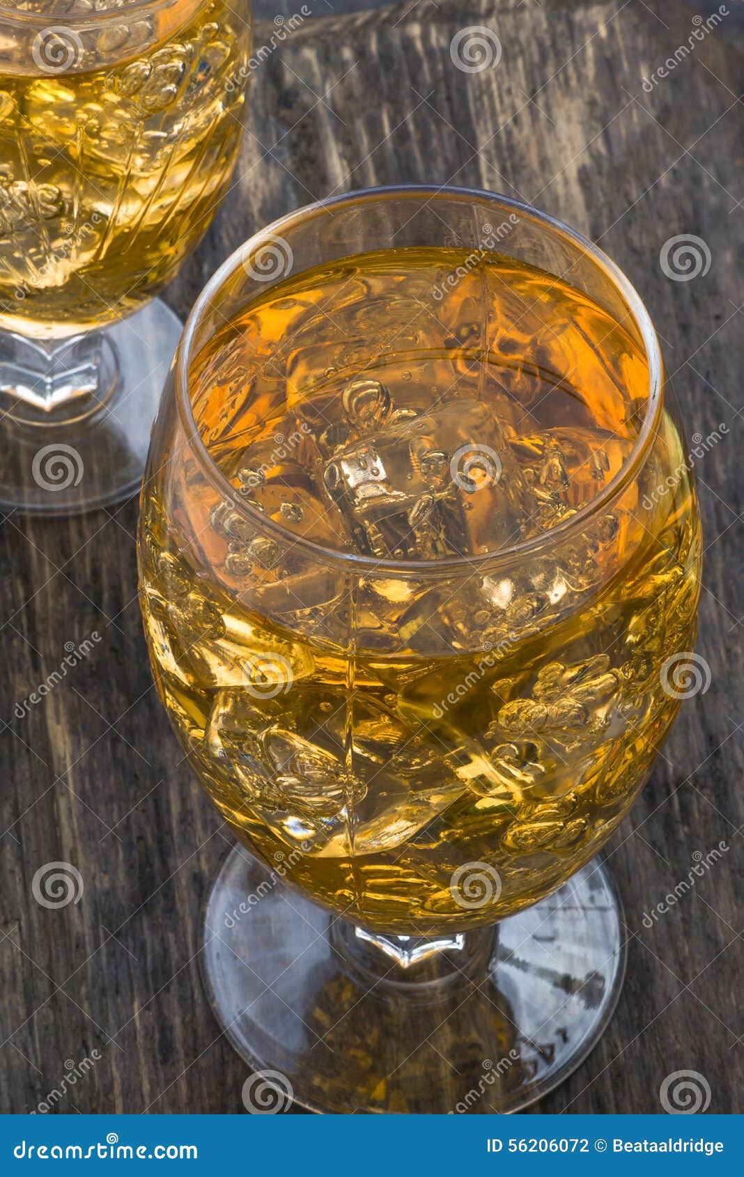 Apple cider with ice cubes stock photo. Image of cold - 56206072