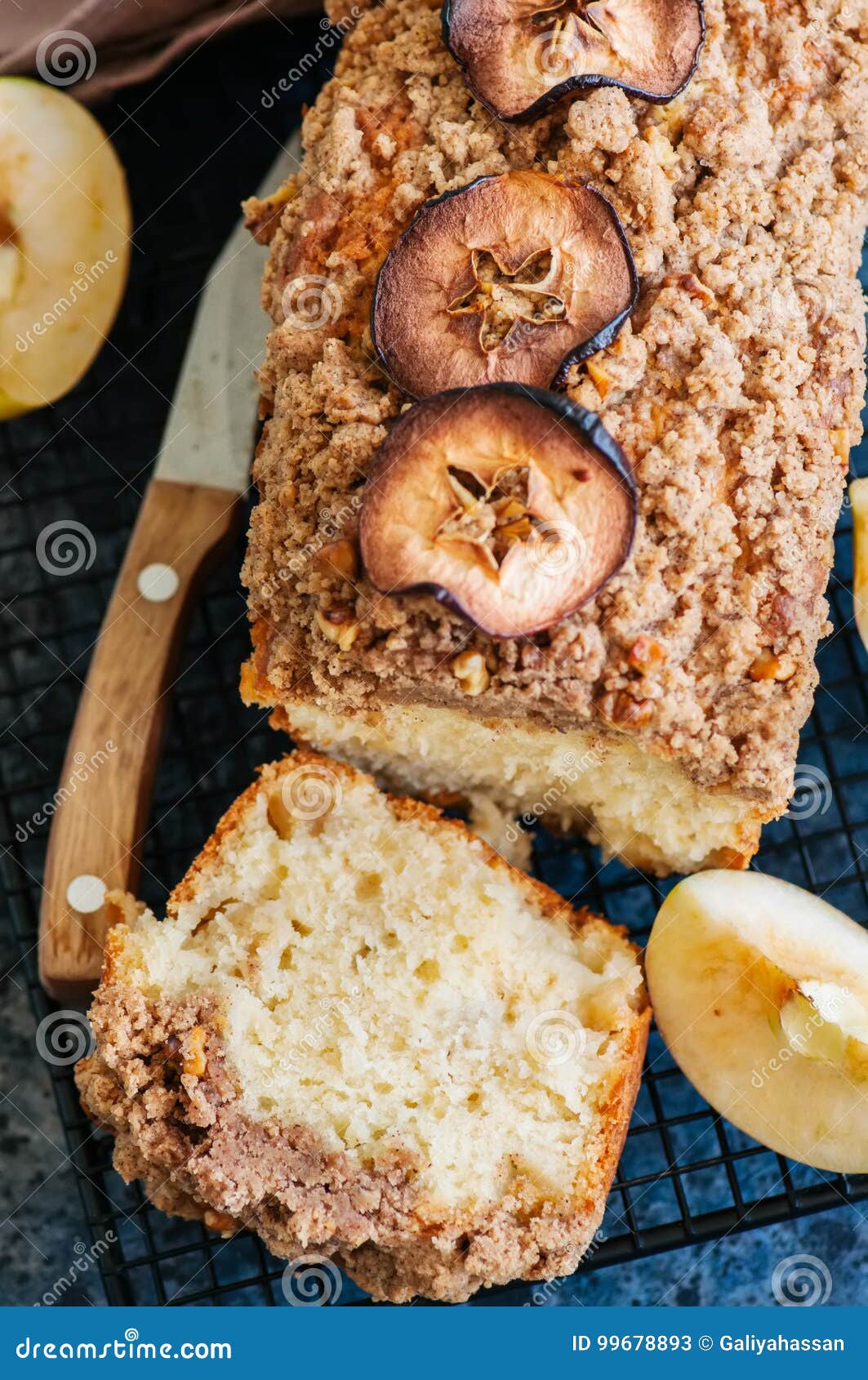 Apple Cinnamon Streusel Cake on a Wire Rack on a Blue Stone Back Stock ...