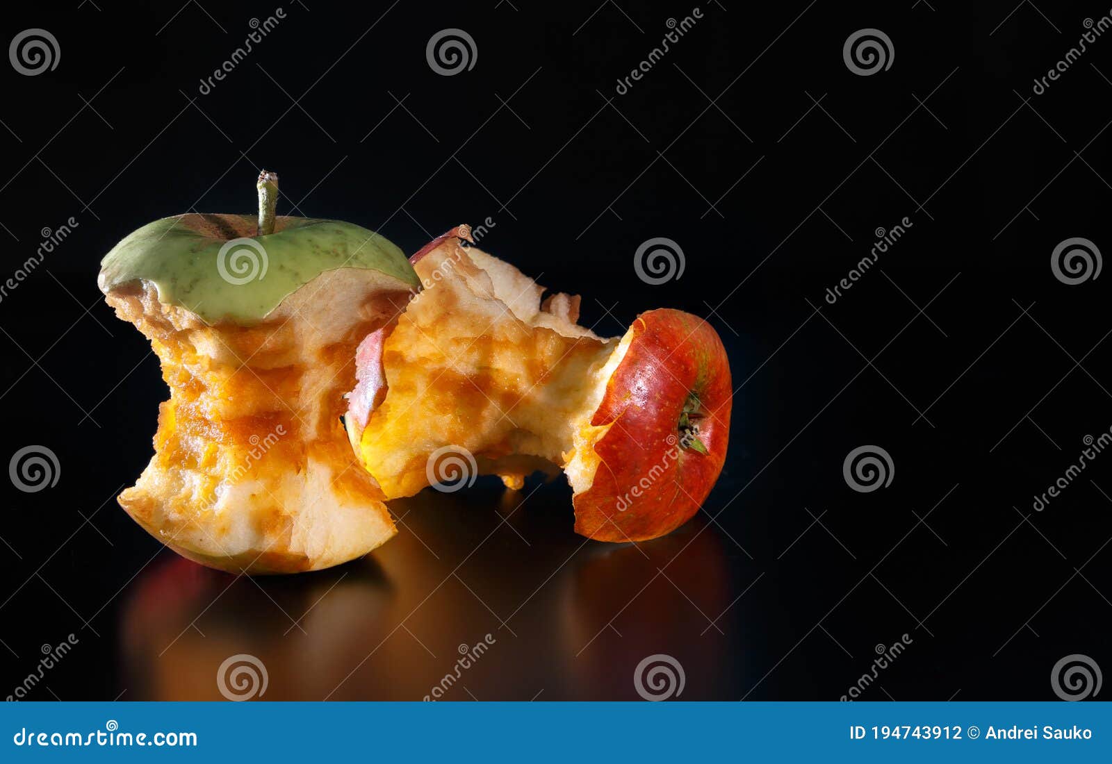 An Apple Core on a Black Background with Reflexion. Ecology Concept ...
