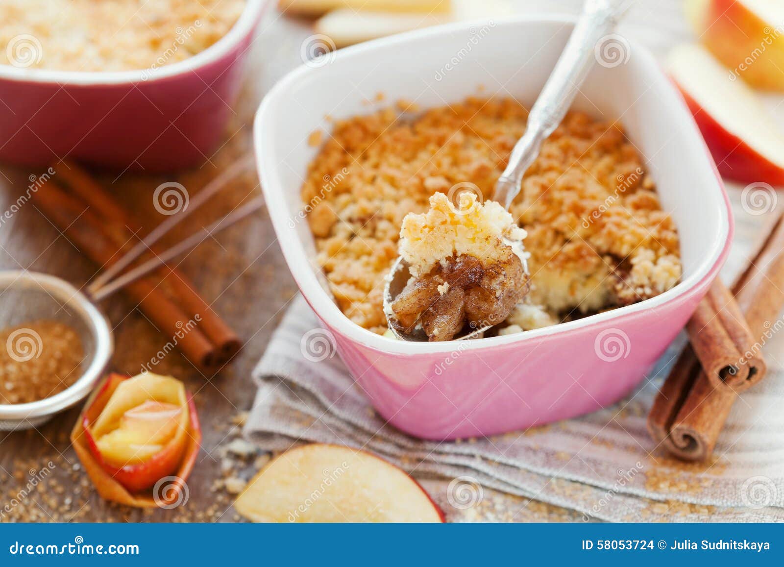 Apple Crumble with Cinnamon on Rustic Table Stock Photo - Image of ...