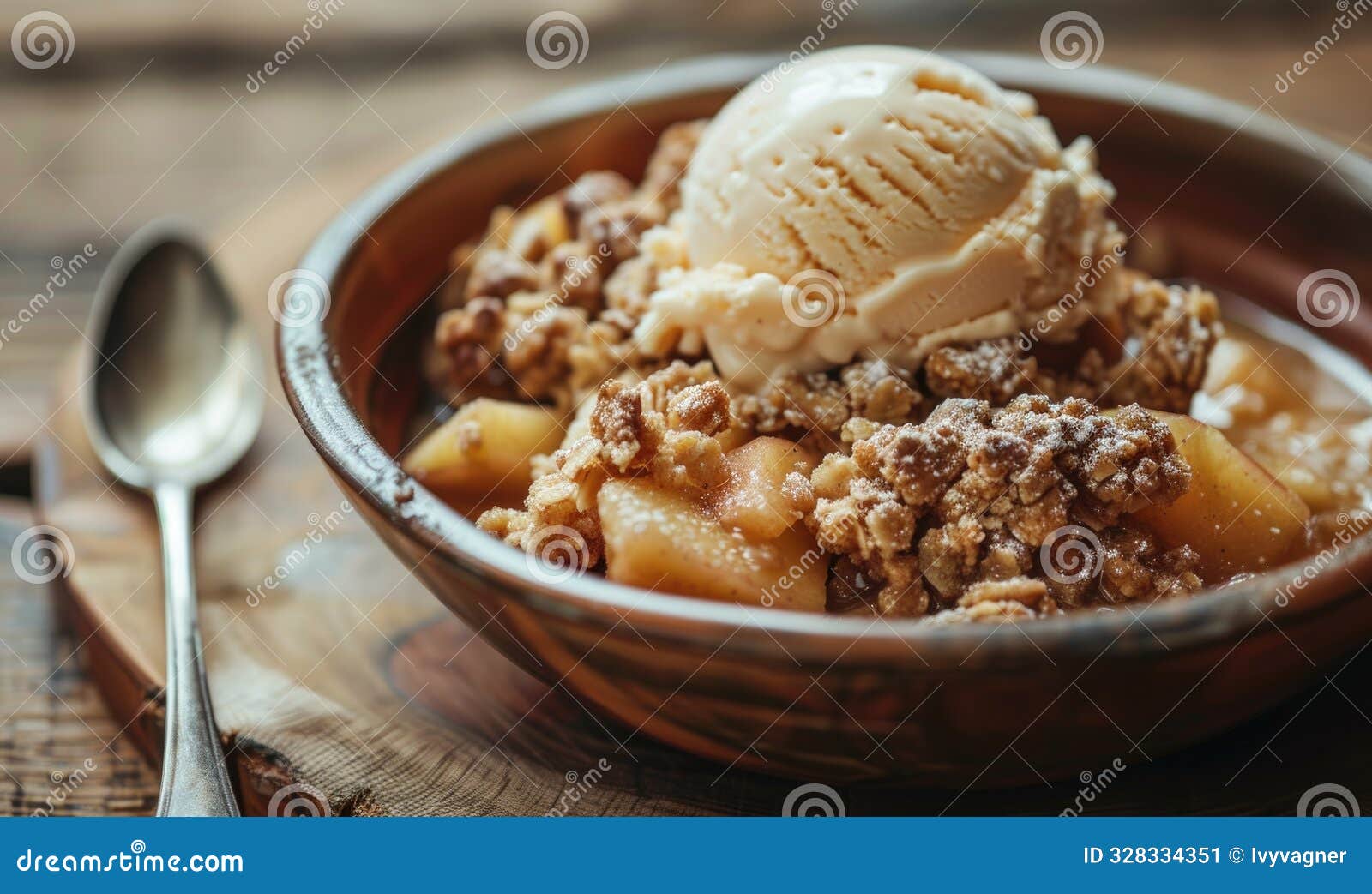 Apple Crumble with a Scoop of Vanilla Ice Cream in a Rustic Bowl Stock ...