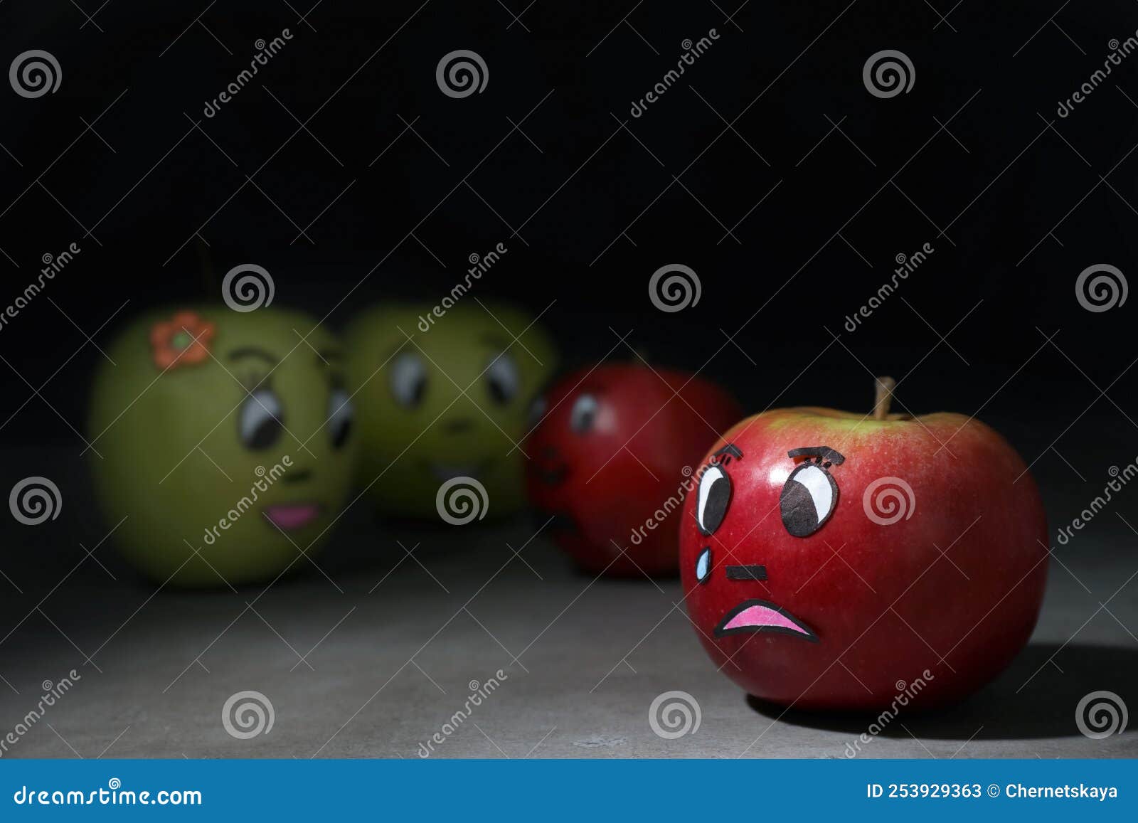 Apple with Crying Face on Grey Table. Concept of Jealousy Stock Image ...