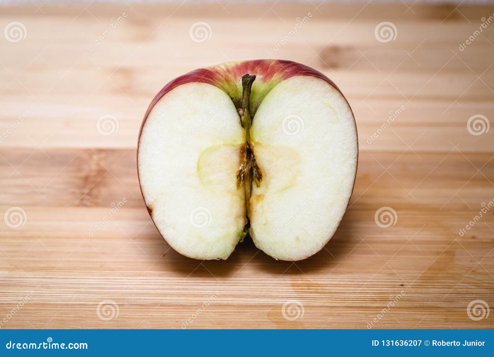 Apple cut in half. stock image. Image of healthy, natural - 131636207